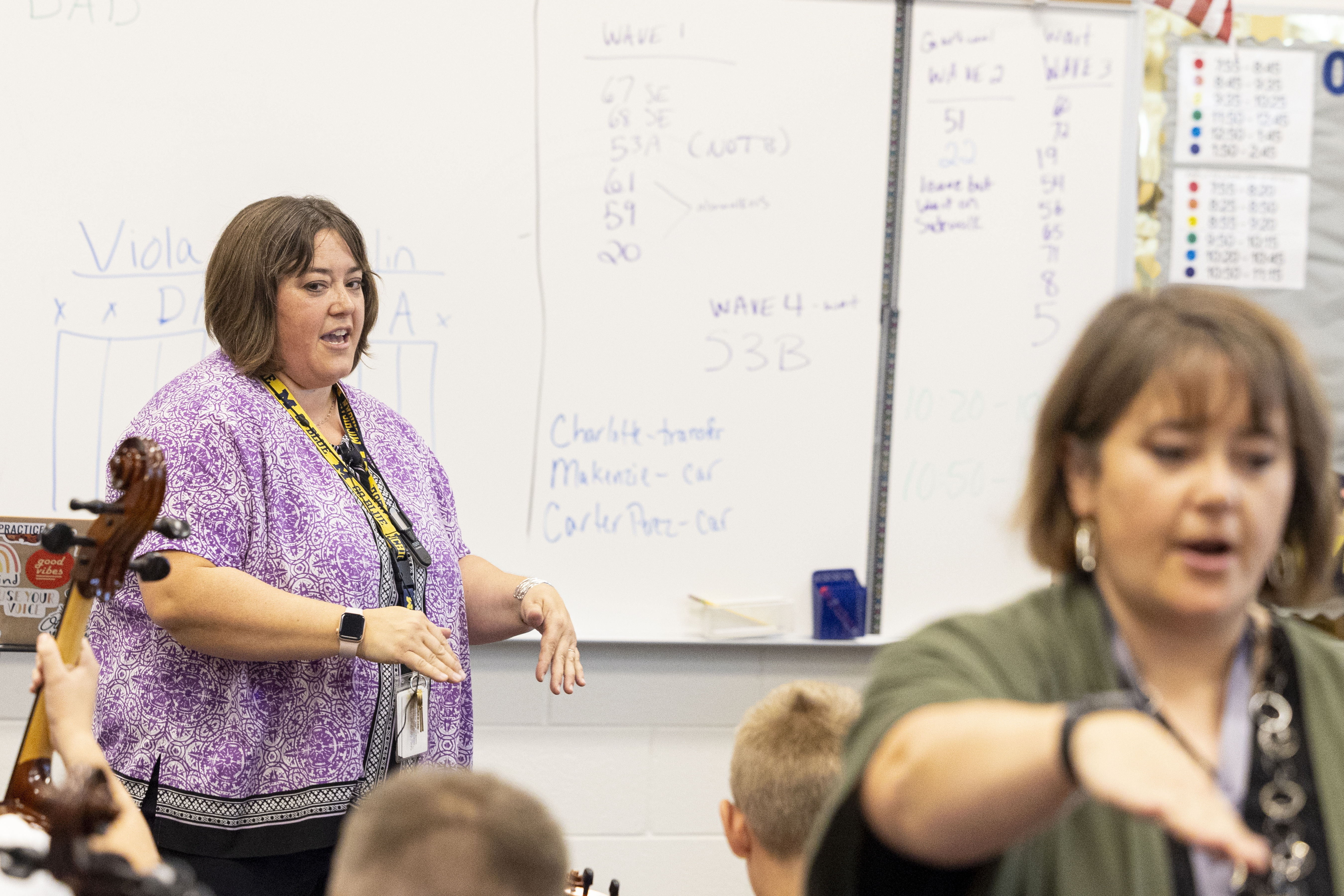 Identical twin sisters teach orchestra at Hudsonville Public Schools ...