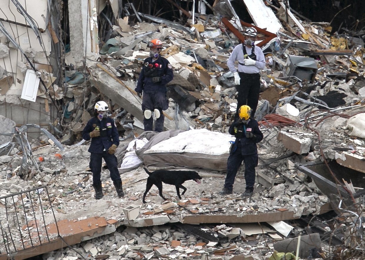 Searching in rubble at Florida condo collapse - pennlive.com
