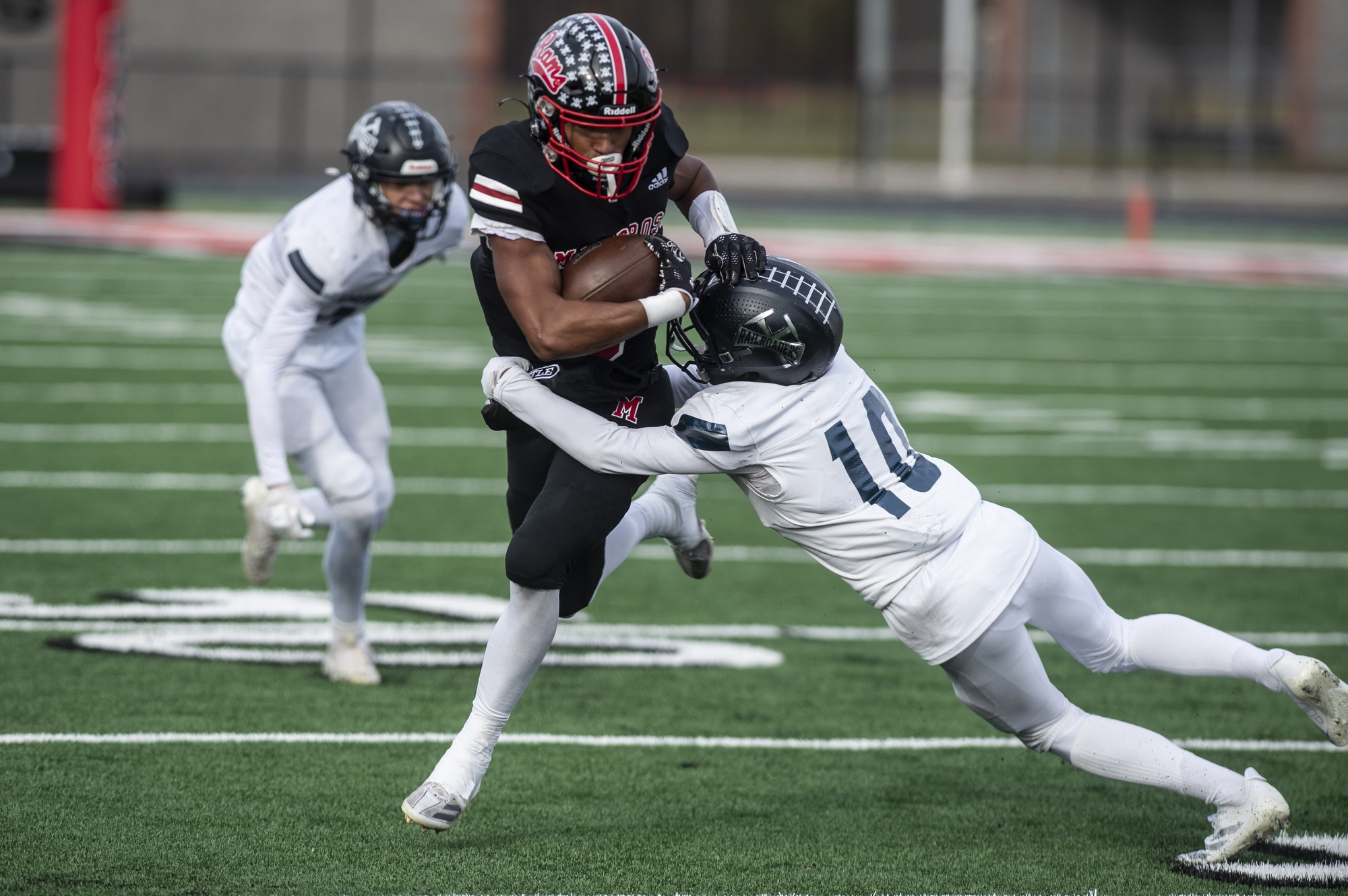75 sports photos that showcase strength, determination in Flint and ...