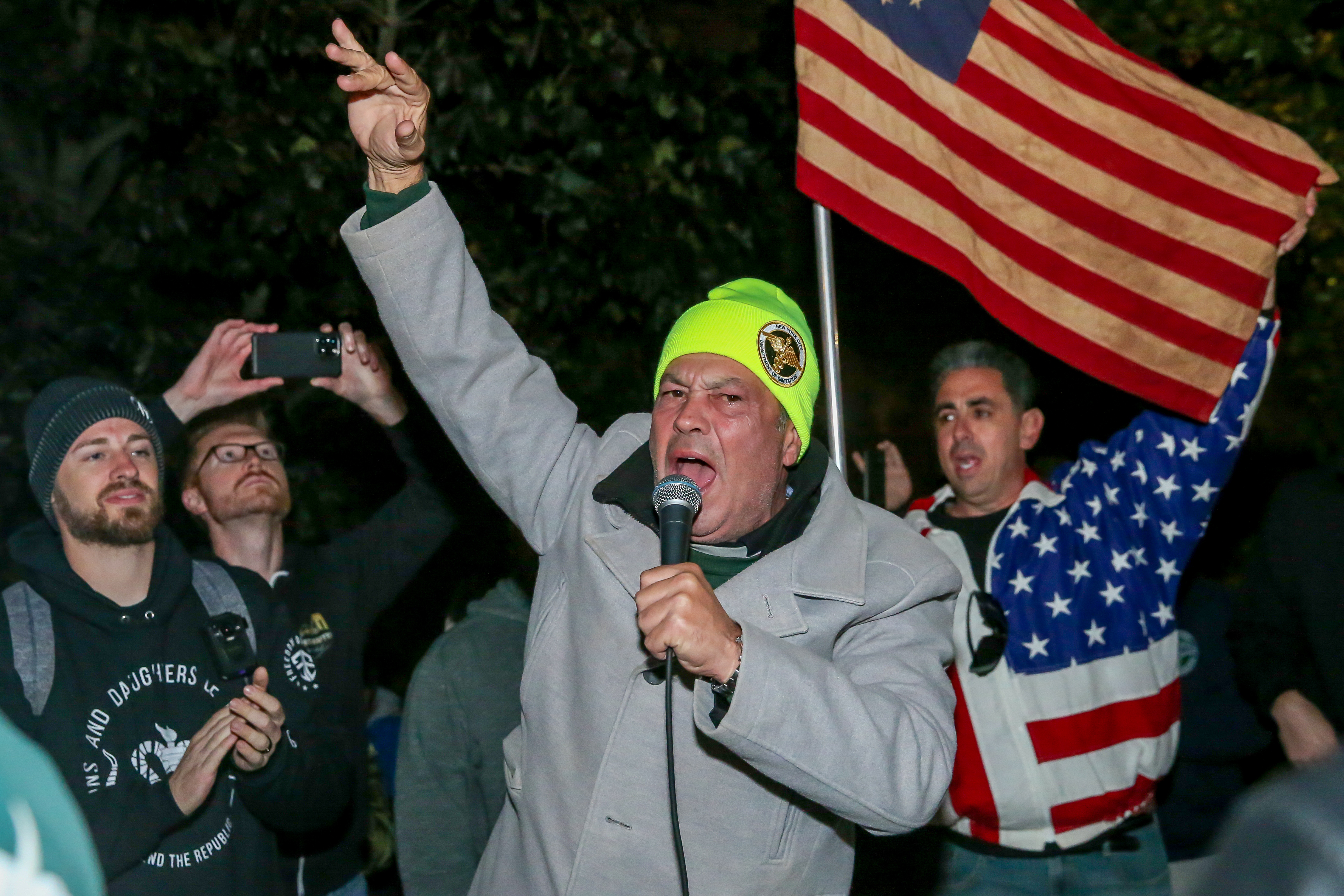 PHOTOS: Protesters line up outside DSNY Garage against NYC Vaccine ...