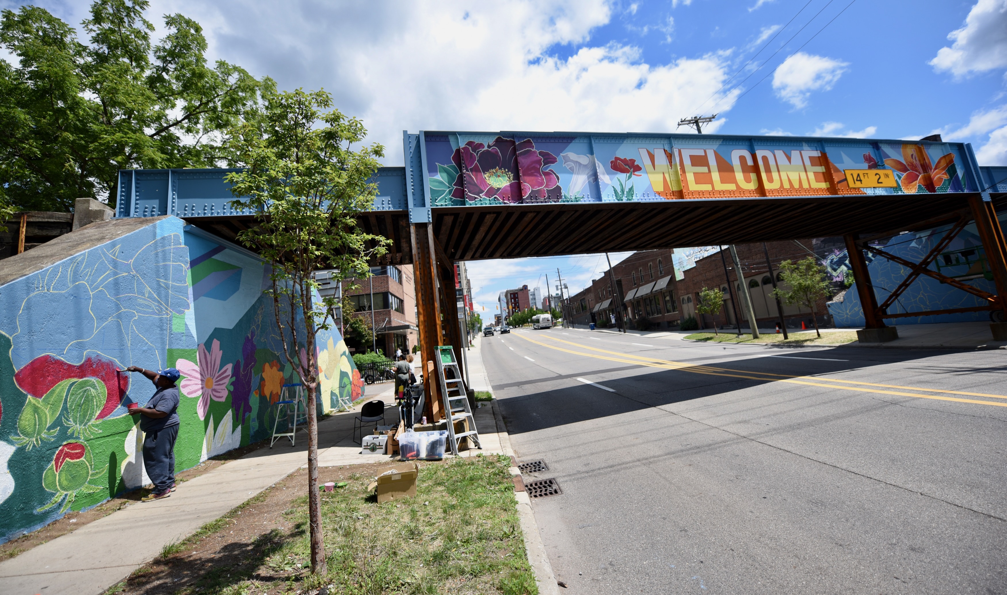 TreeTown Murals community paint day activity with Delonis Center ...