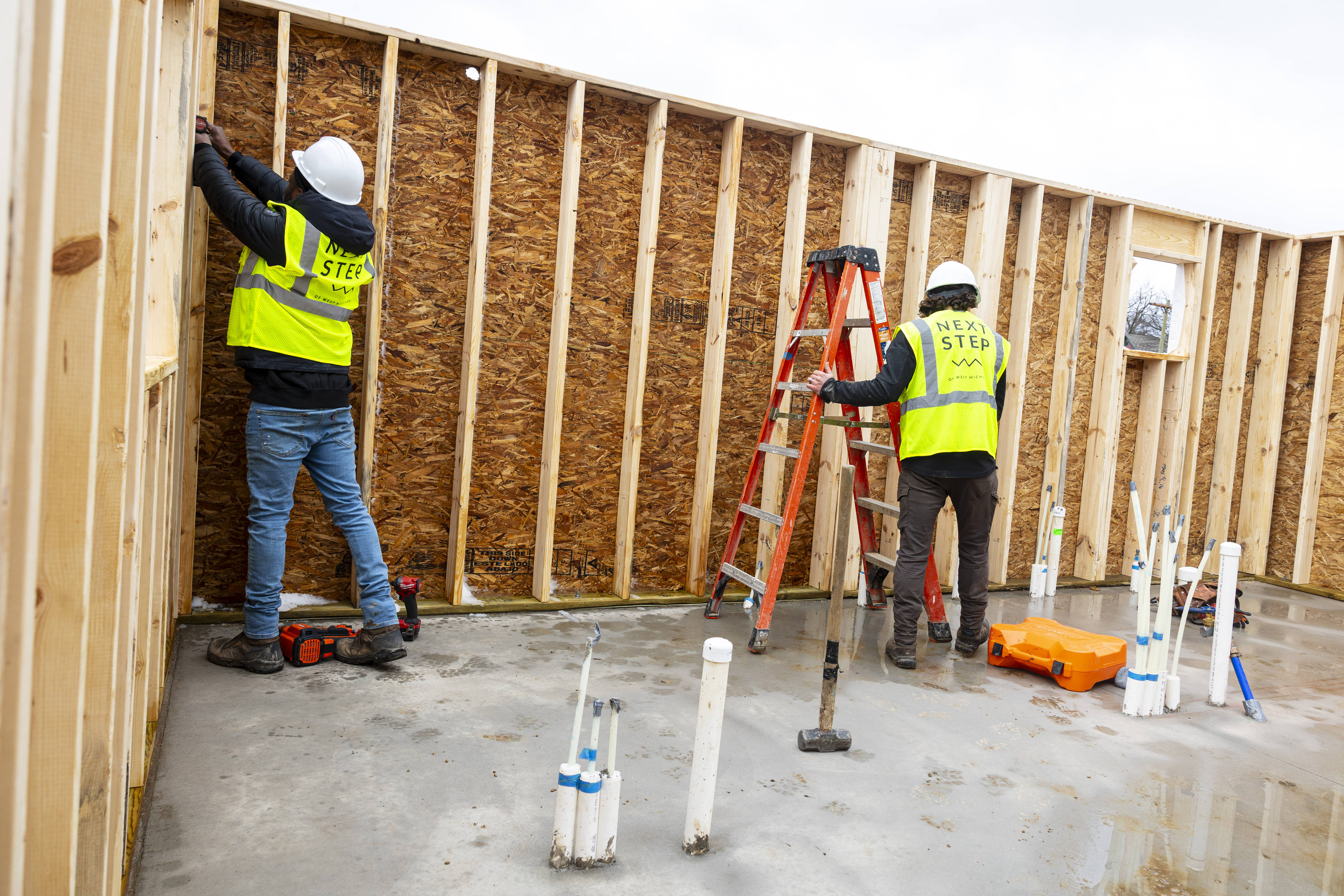 Mel Trotter Ministries holds wall raising ceremony for Hope Village in ...
