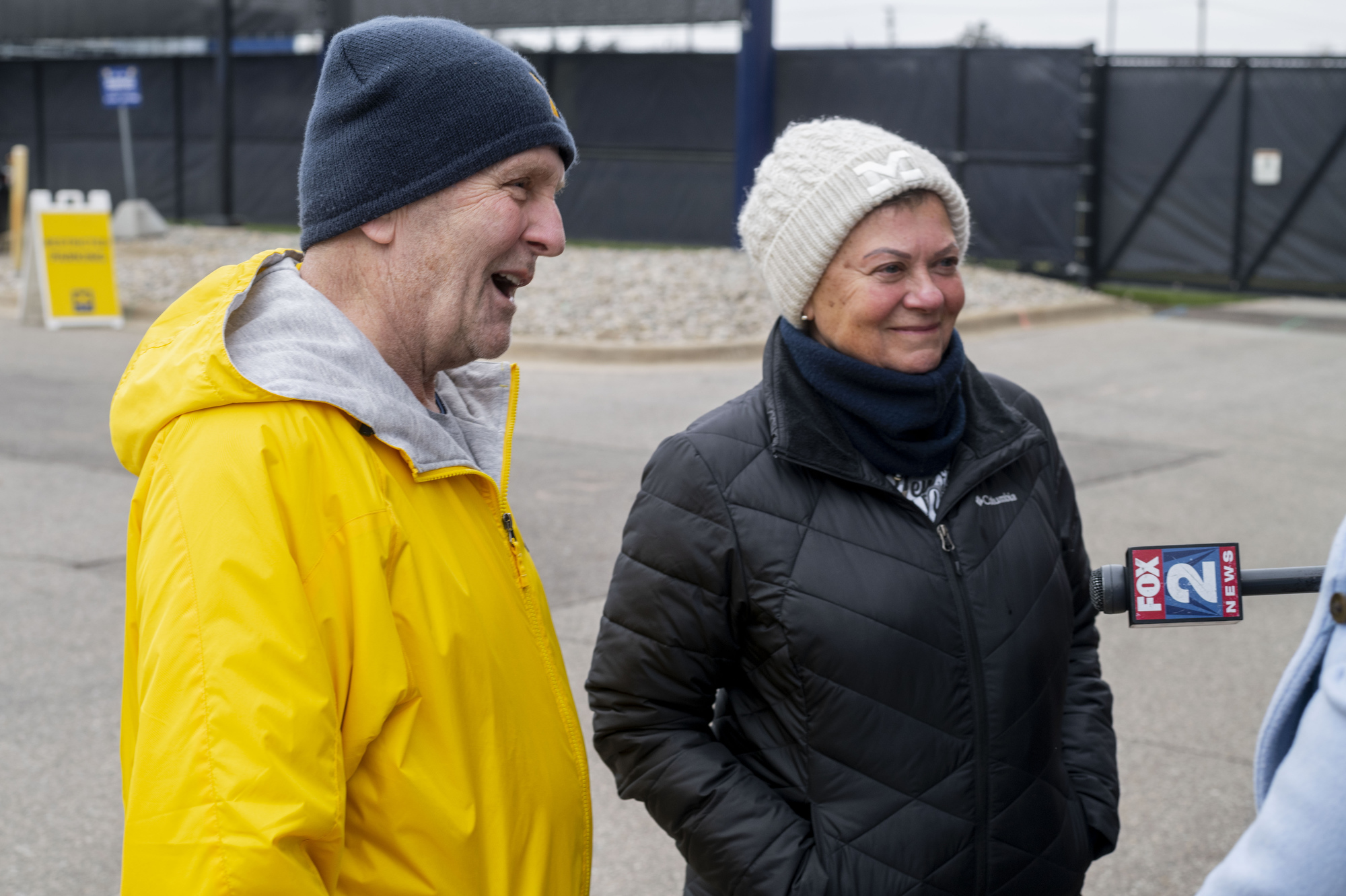 Michigan football players depart Ann Arbor bound for national ...