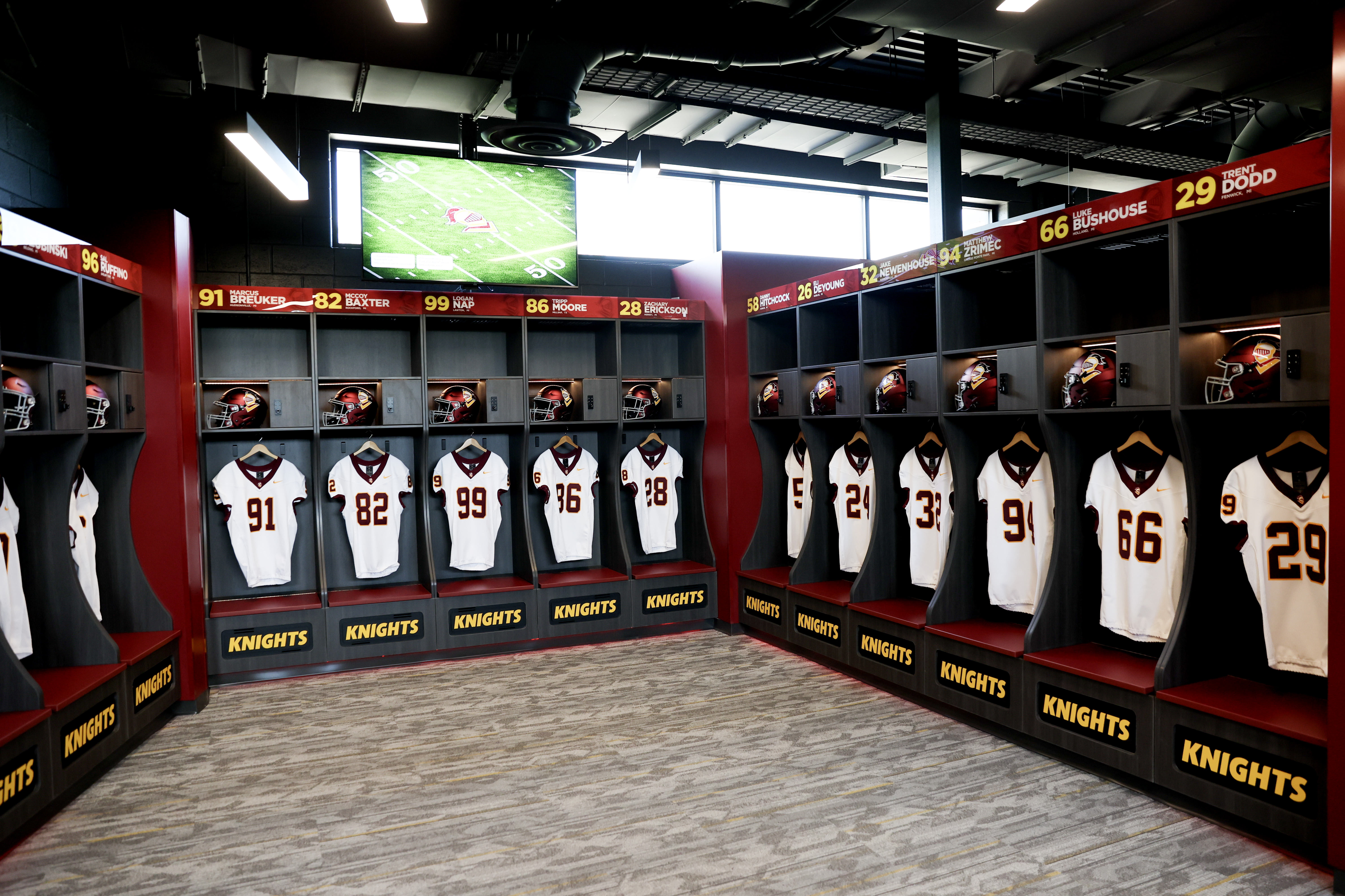 Calvin football players see their newly built locker room for the first ...