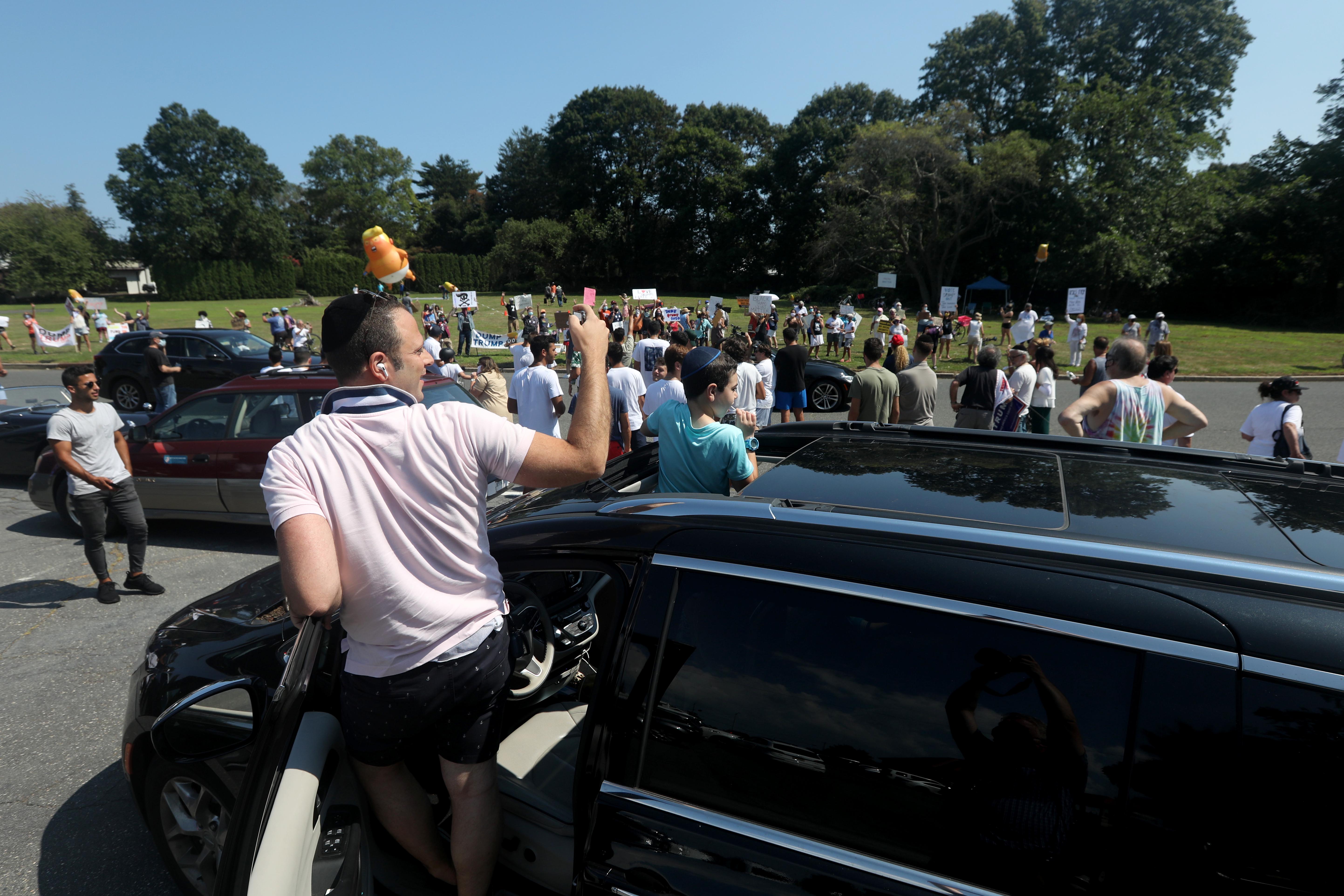 Protest greets Trump arrival - nj.com
