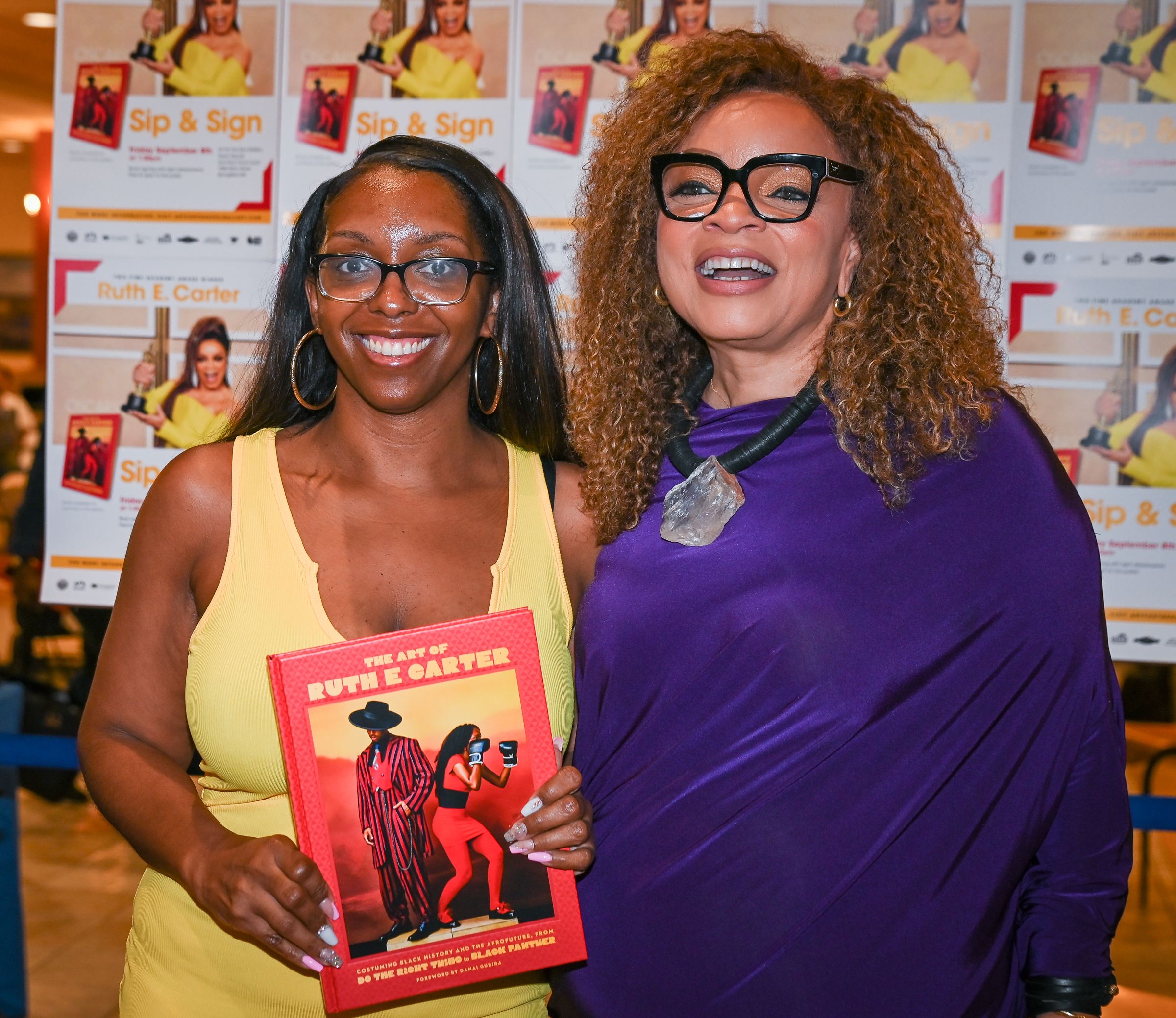 Author and Oscar Award winner Ruth E. Carte draws fans at the Sip ...