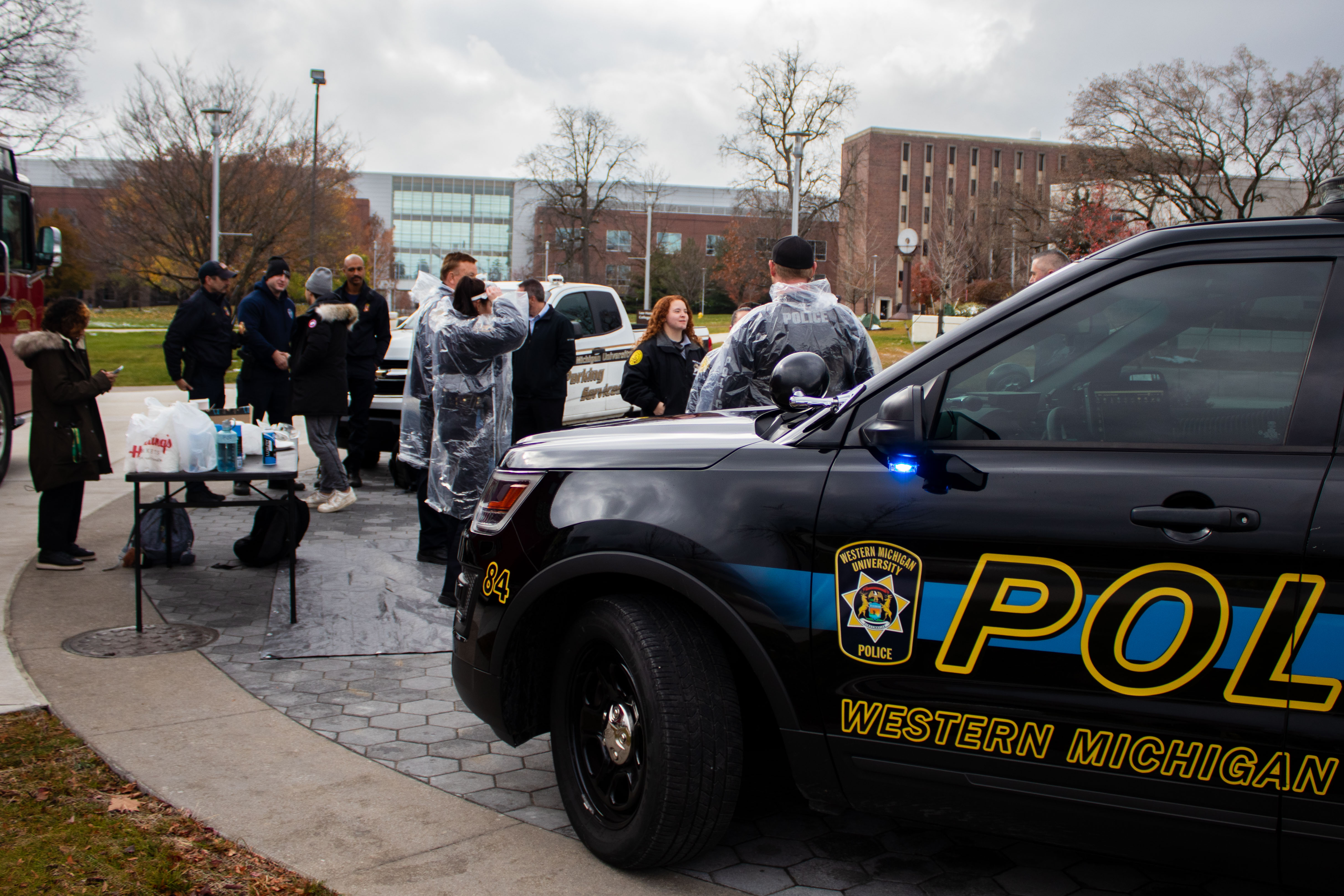 Students throw pies at Western Michigan officers for fundraising ...