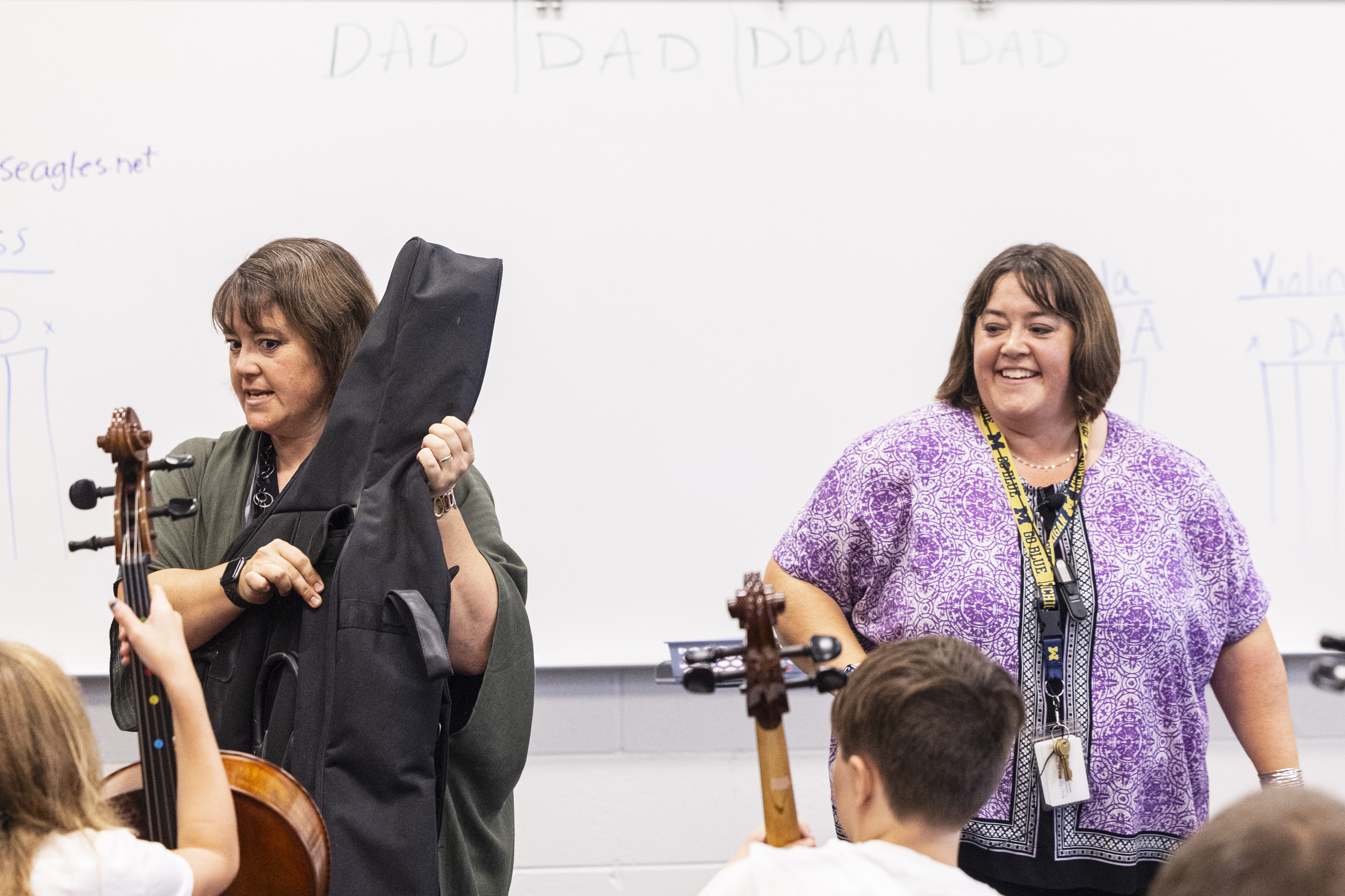 Identical twin sisters teach orchestra at Hudsonville Public Schools ...