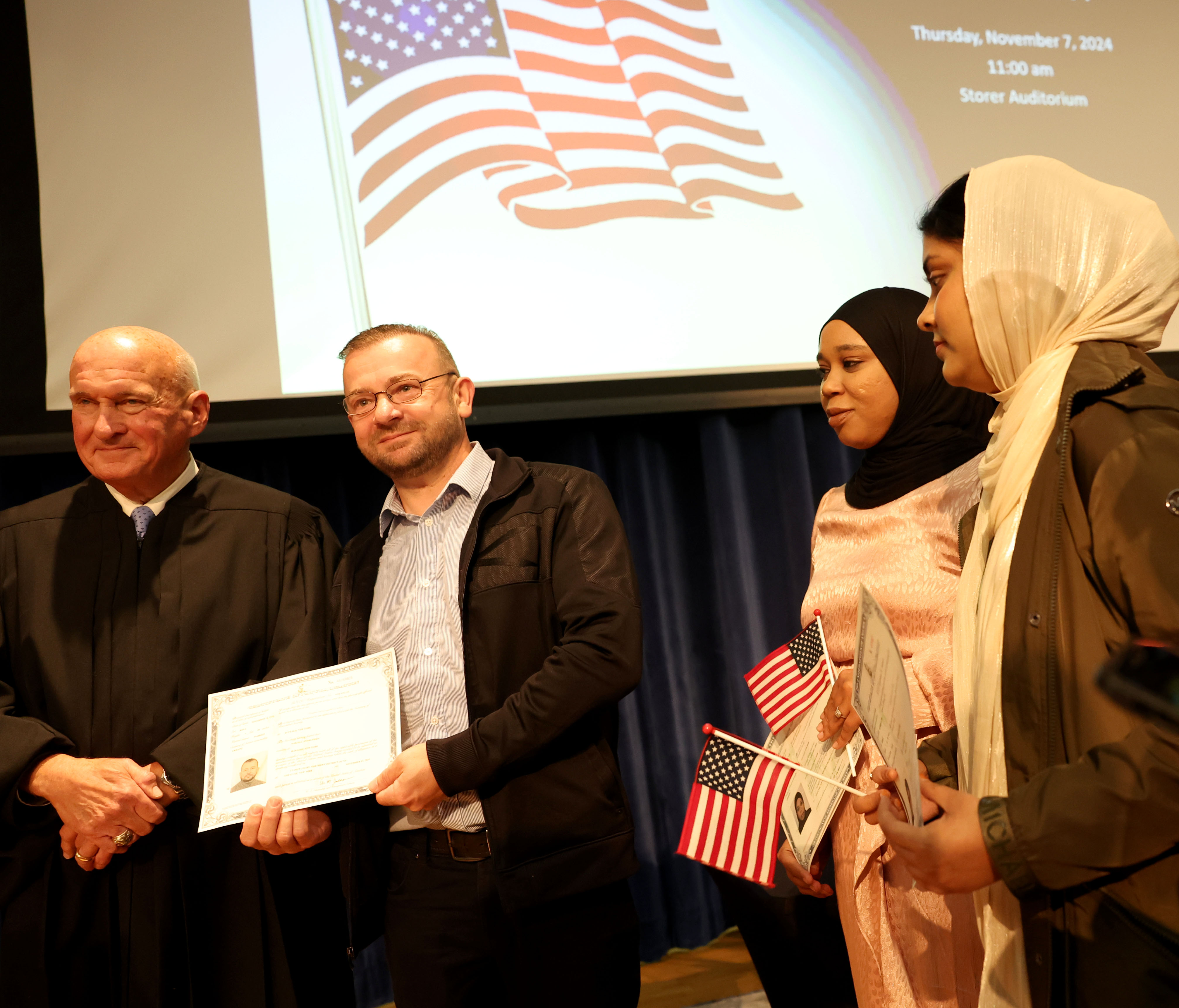 Eighty new citizens welcomed at OCC ceremony - syracuse.com