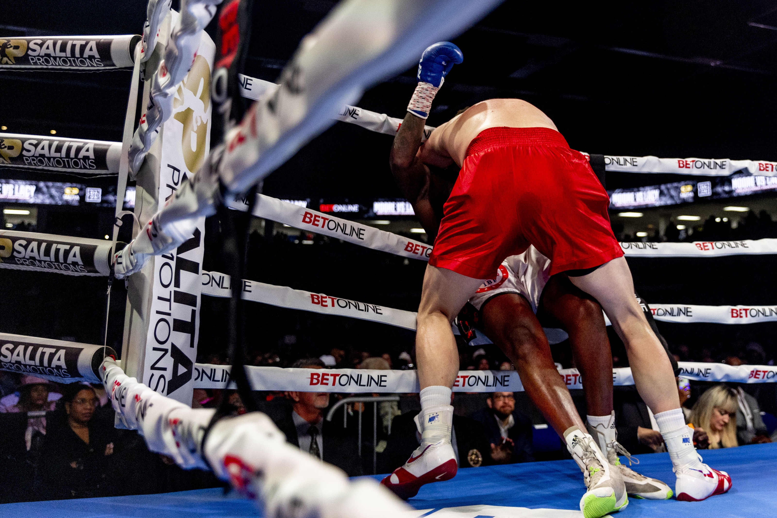Boxers fly out of the ring and into crowd in WWE style at Michigan bout ...