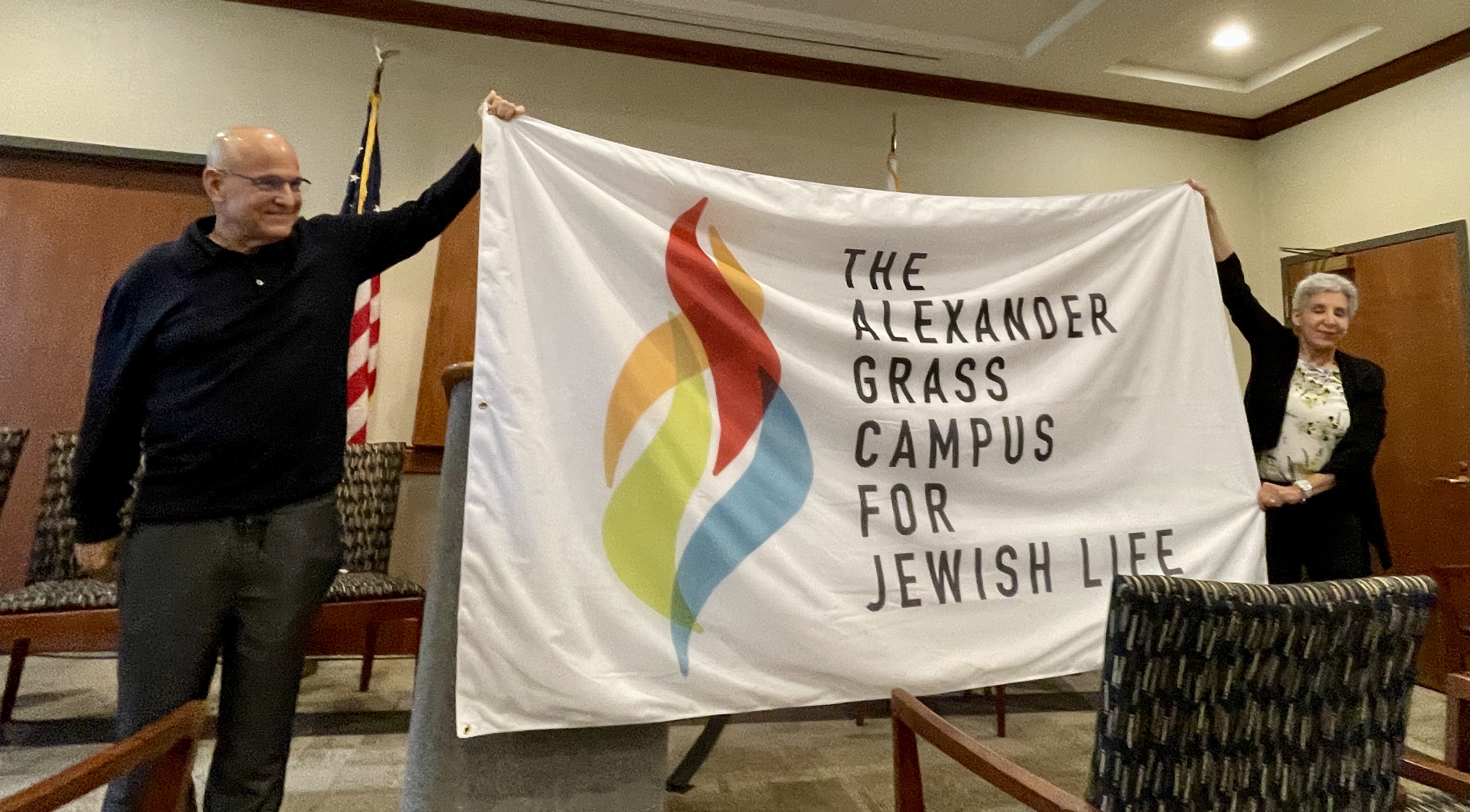 The Jewish Federation of Greater Harrisburg raises a flag as it ...