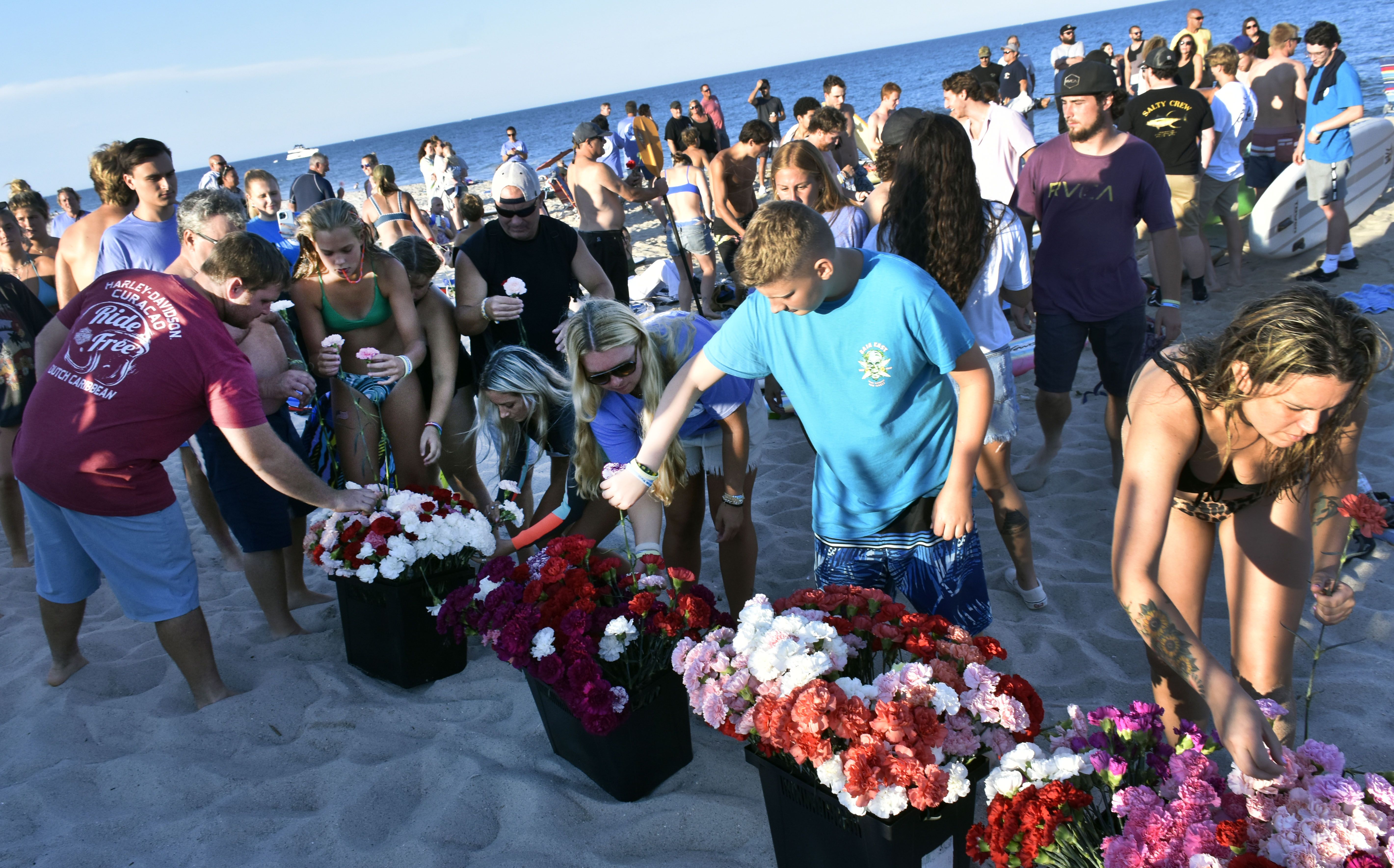 Surfing ‘paddle out’ honors young N.J. couple killed in road trip crash ...