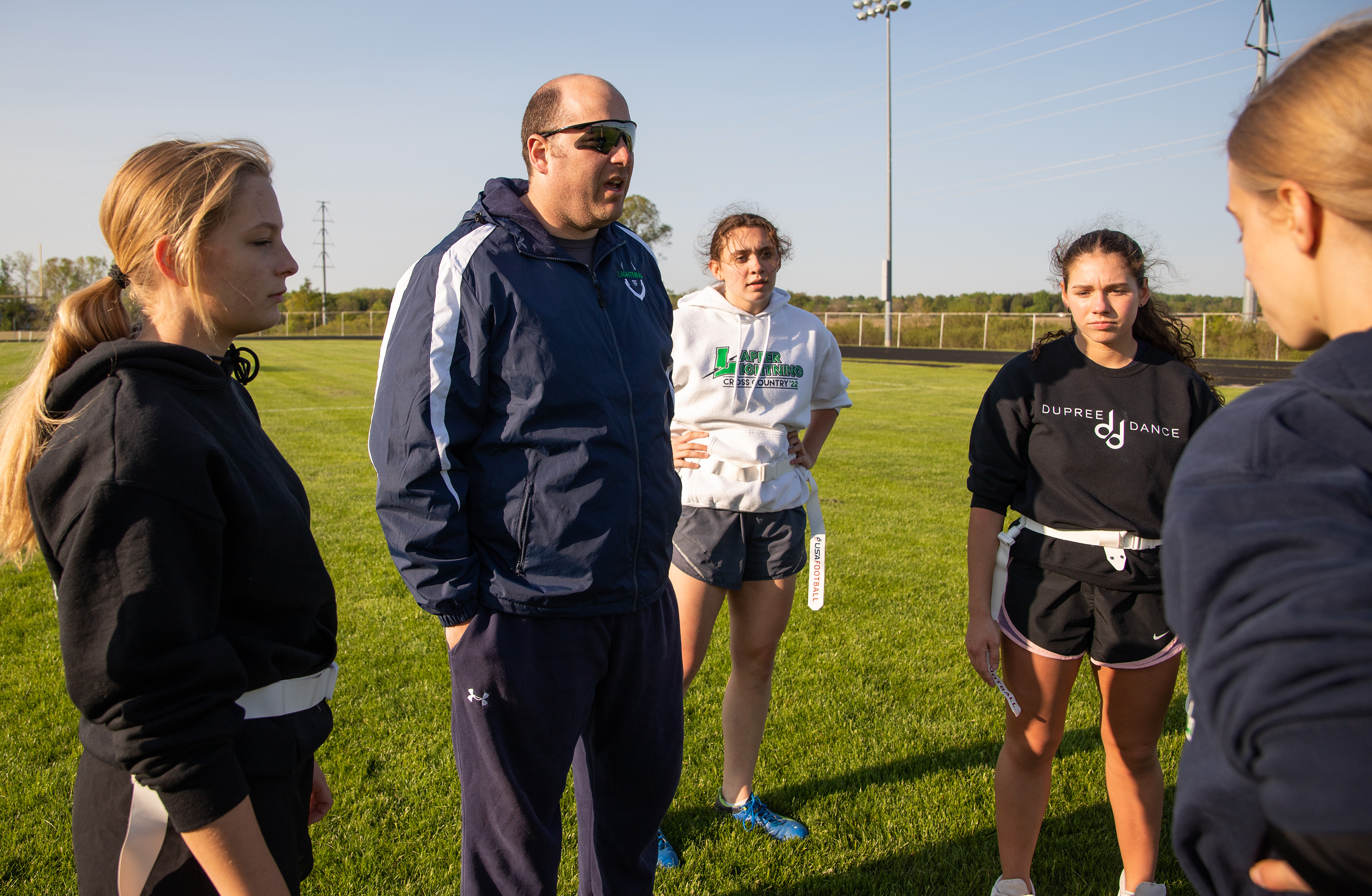 Lapeer high school girls participate in flag football pilot league ...