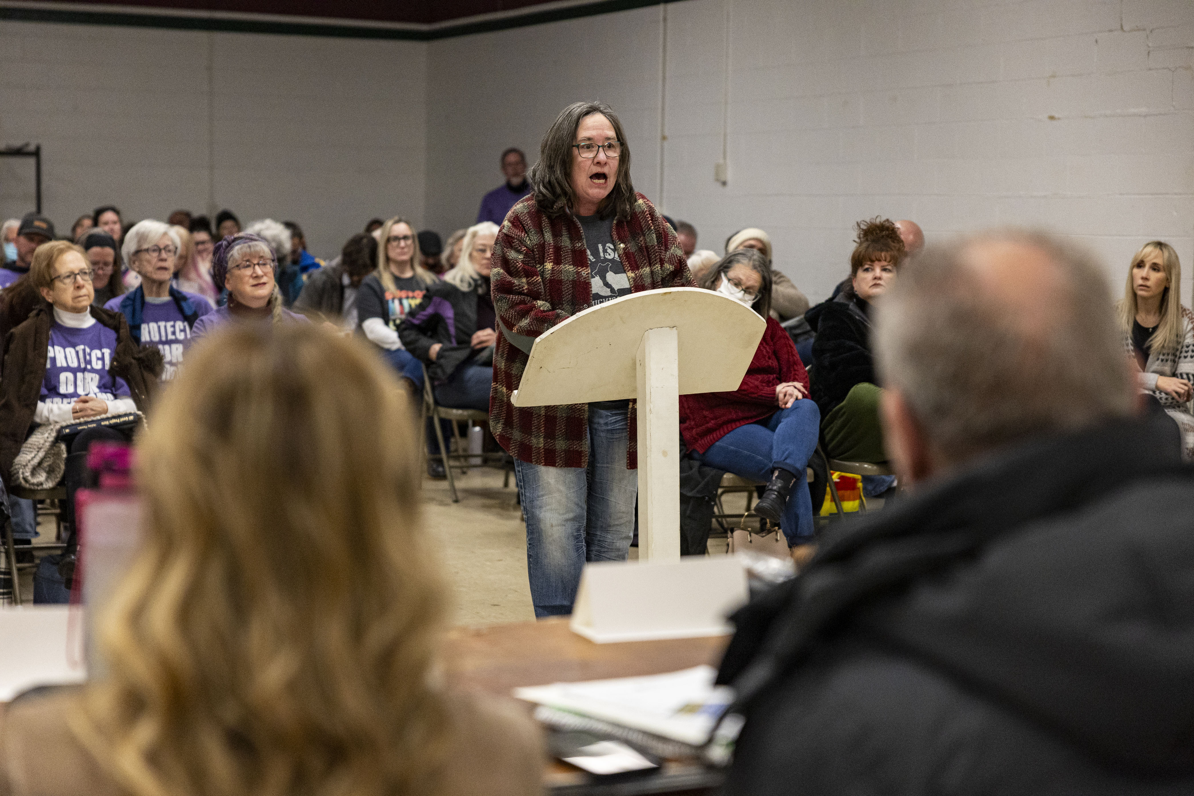 Community members discuss book bans during a Lapeer District Library ...