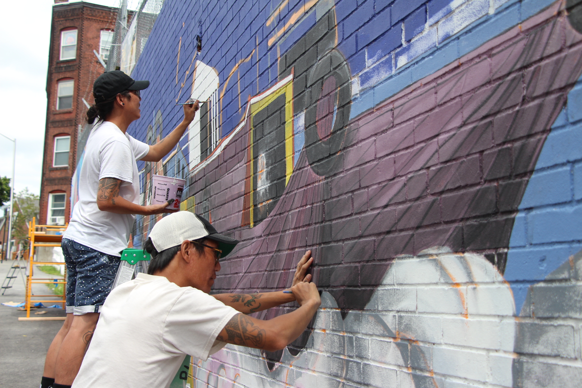 Murals from POW WOW Worcester 2021 encourage children to reach for ...