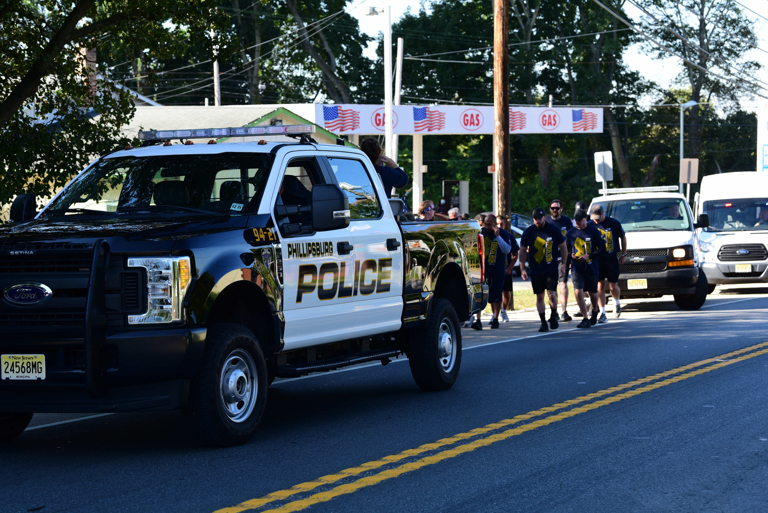 Warren County police hit the streets in Torch Run to benefit Special ...