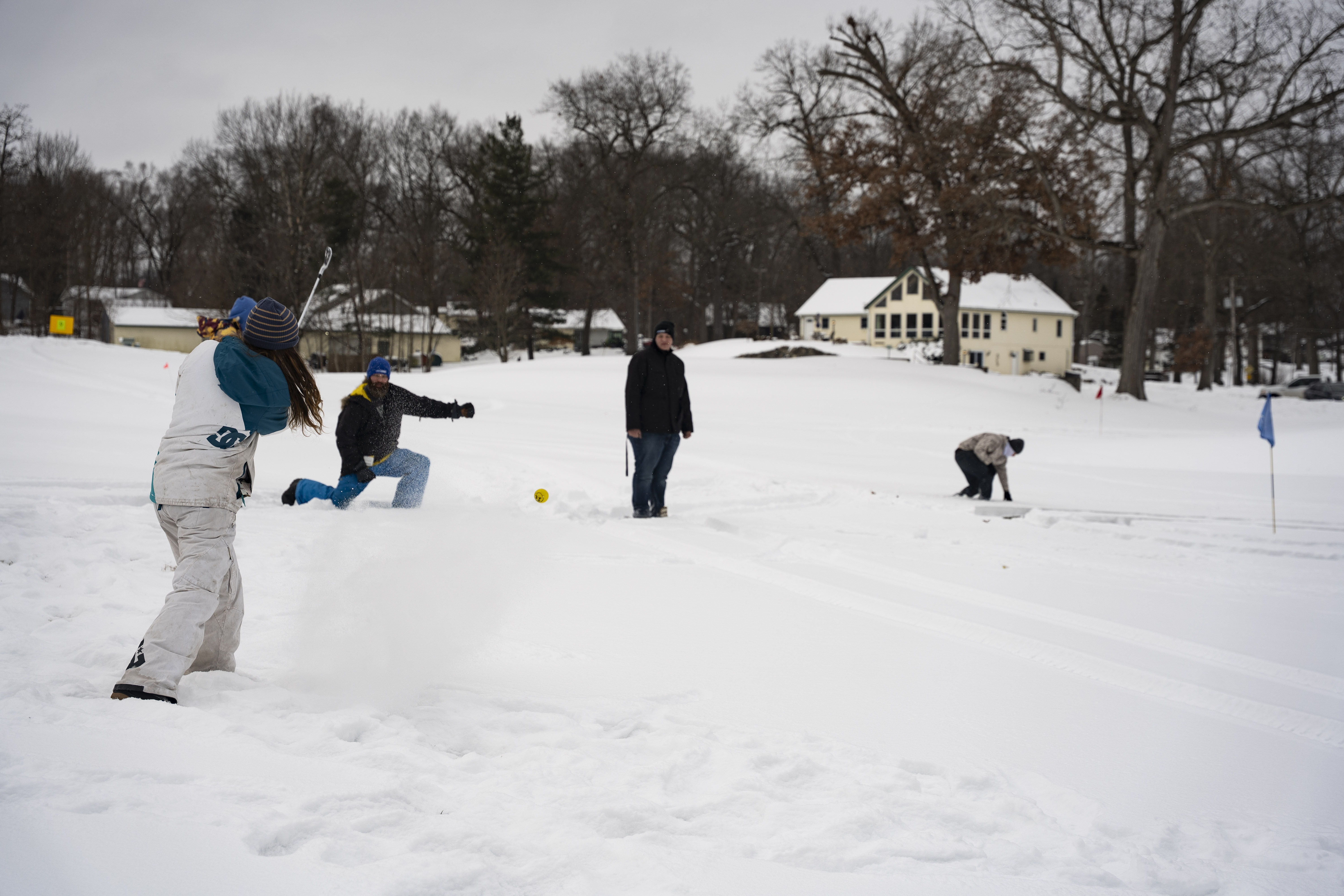 Golfers play through the snow at the annual Kiwanis Chili Golf Classic ...