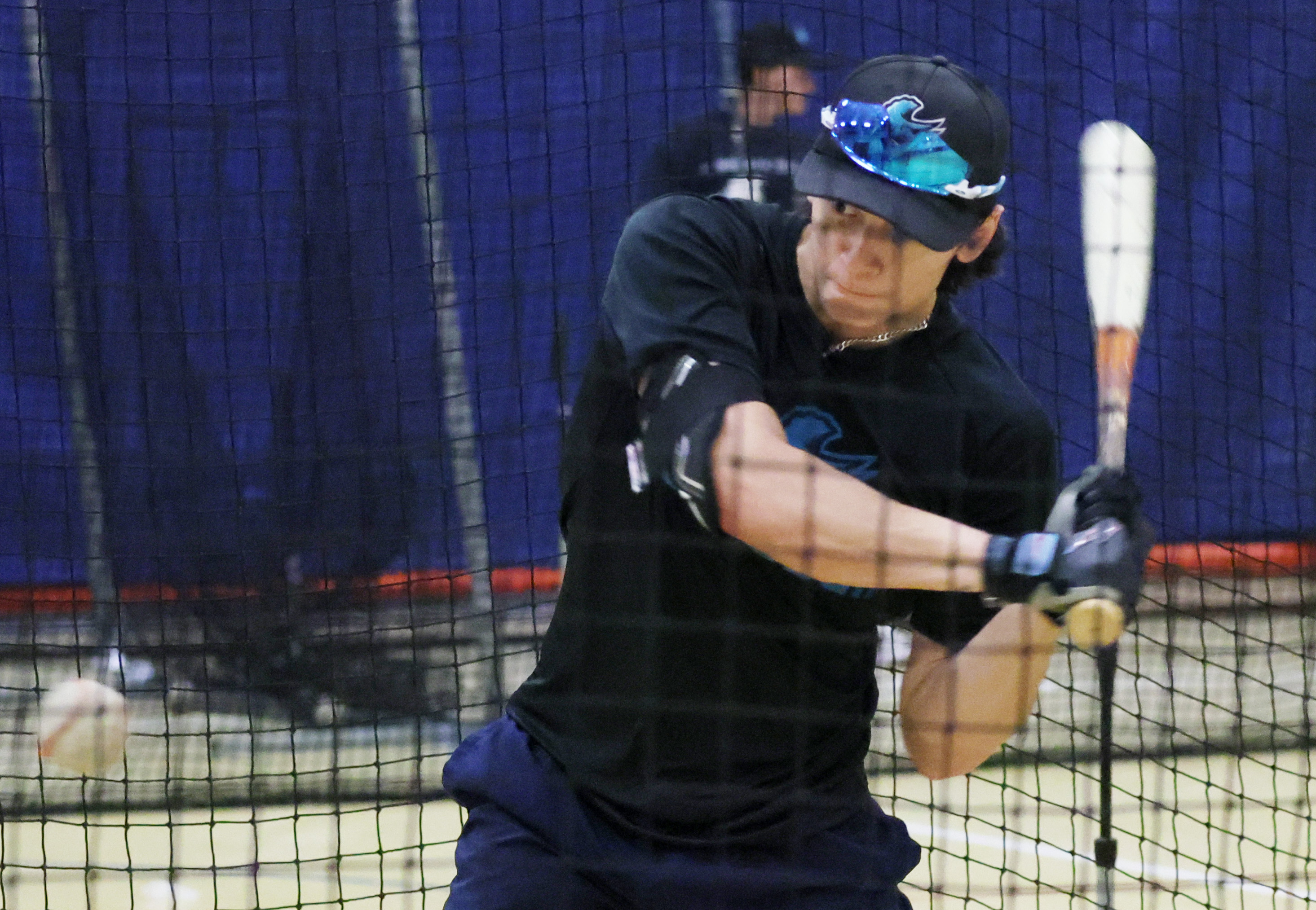 The Tri-C Triceratops baseball team practices before the start of their ...