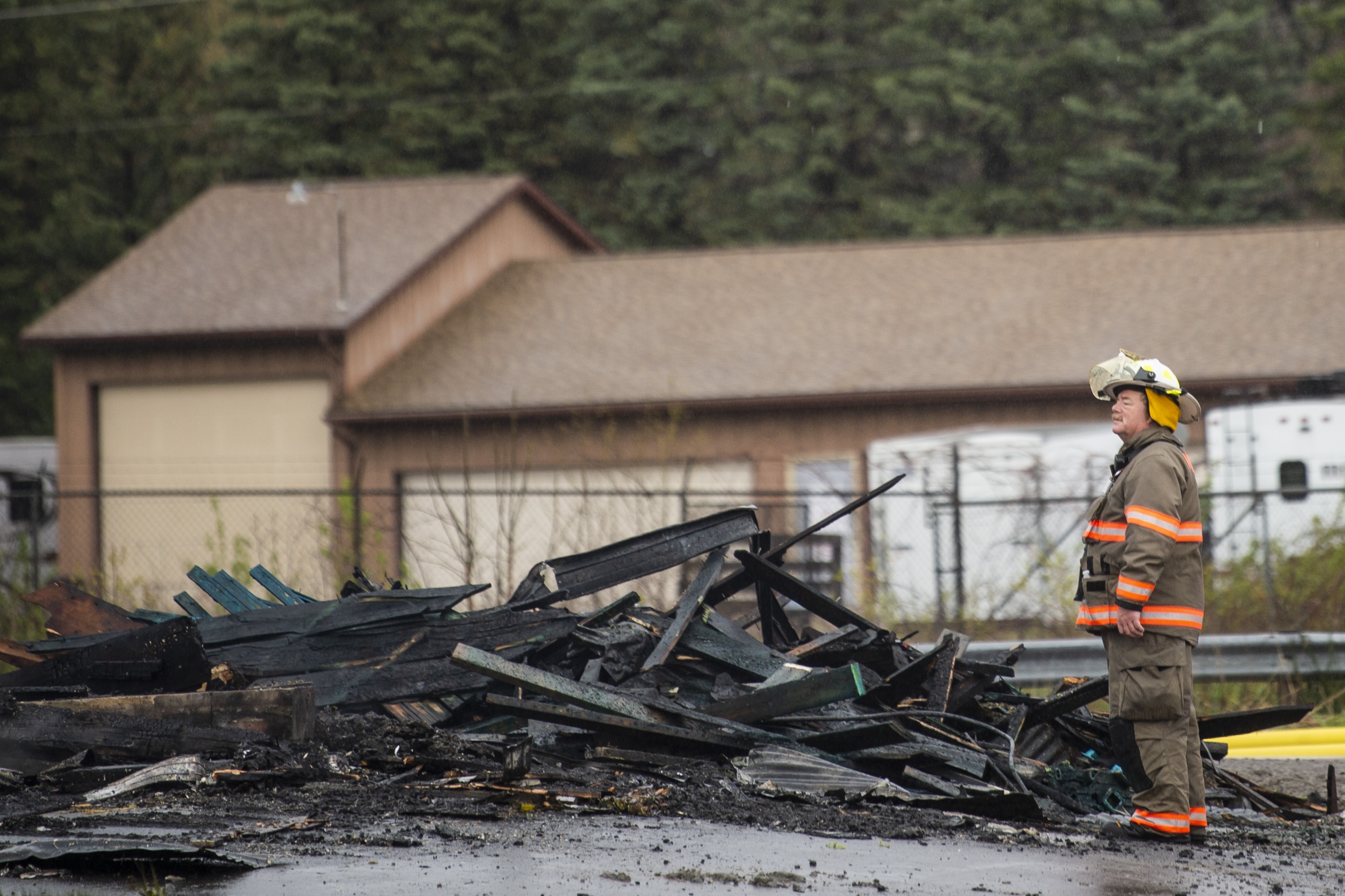 First responders battle building fire at Pajot Feed and Supply in ...