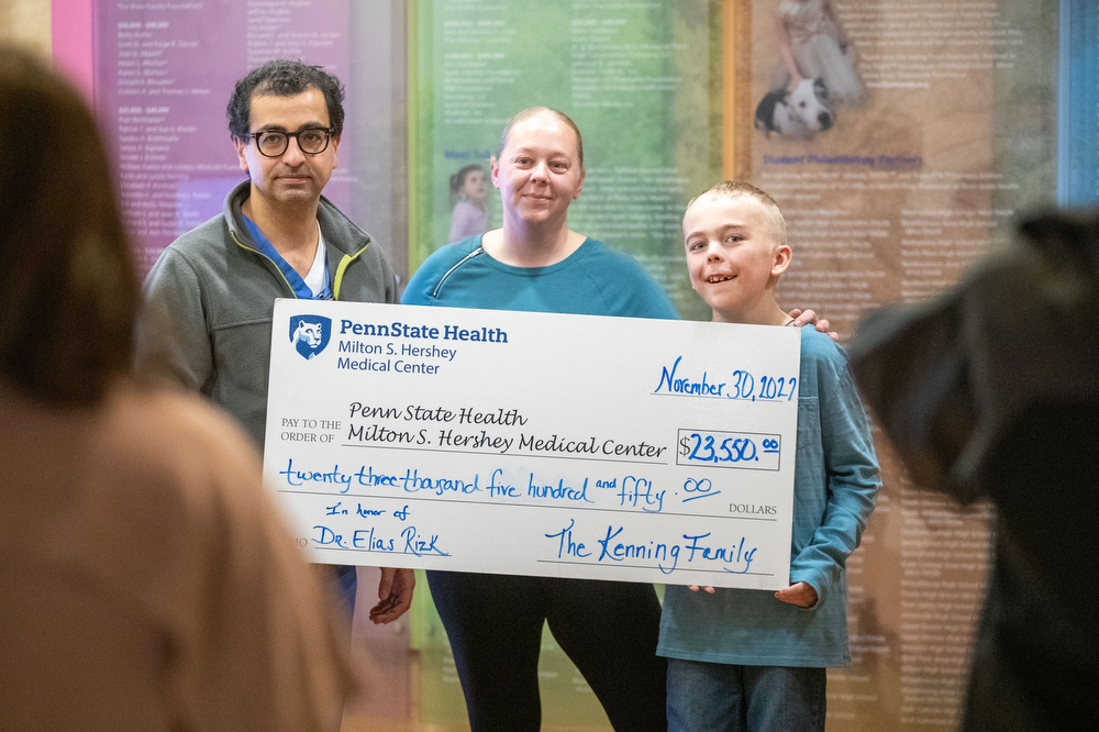 Family presents Hershey doctor with $23K after he saved the life of ...