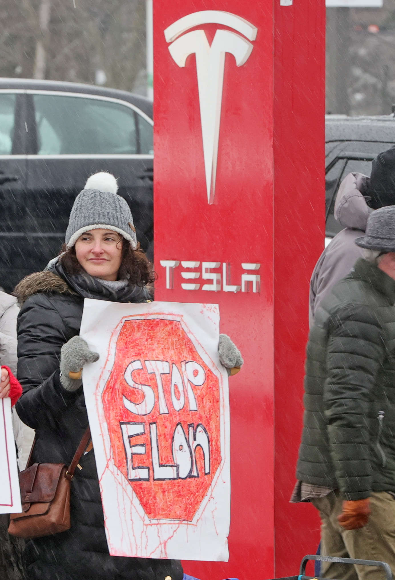 Rally at Tesla Motors Cleveland in Lyndhurst in protest of Elon Musk’s ...
