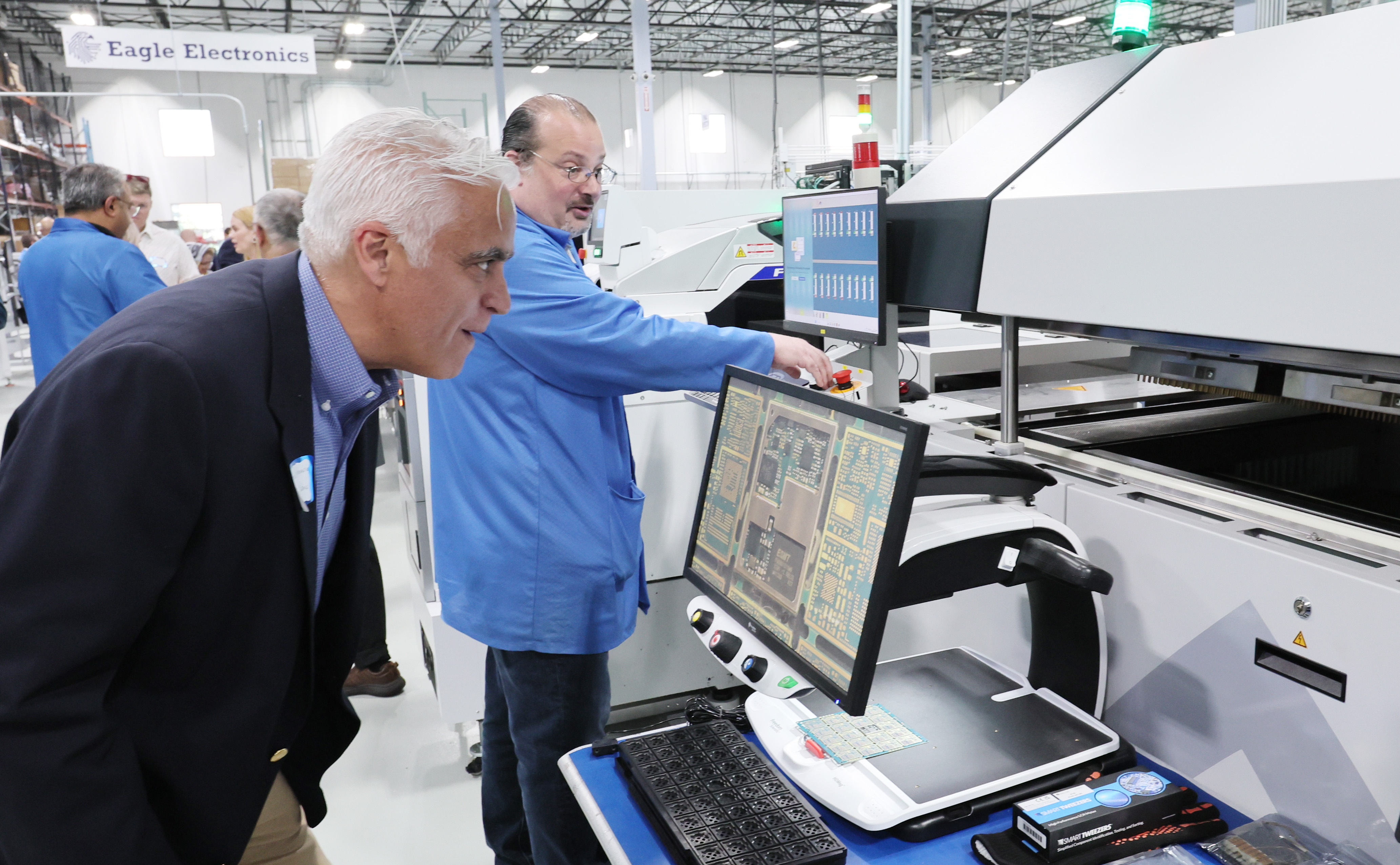 Eagle Electronics invites guest to tour their 4G module production line ...