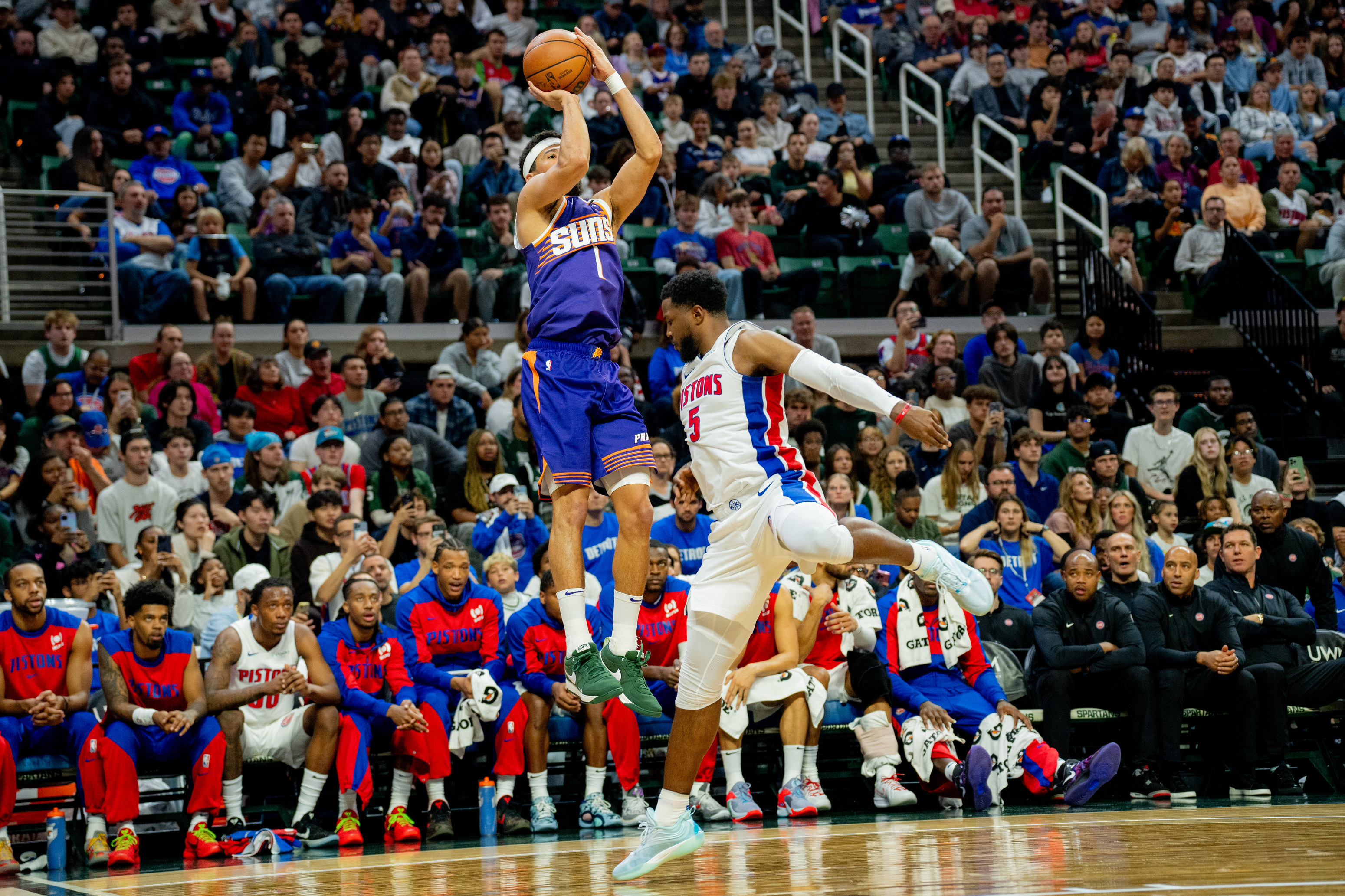 Phoenix Suns Devin Booker unveils 'Michigan State' Nike Book 1 at ...