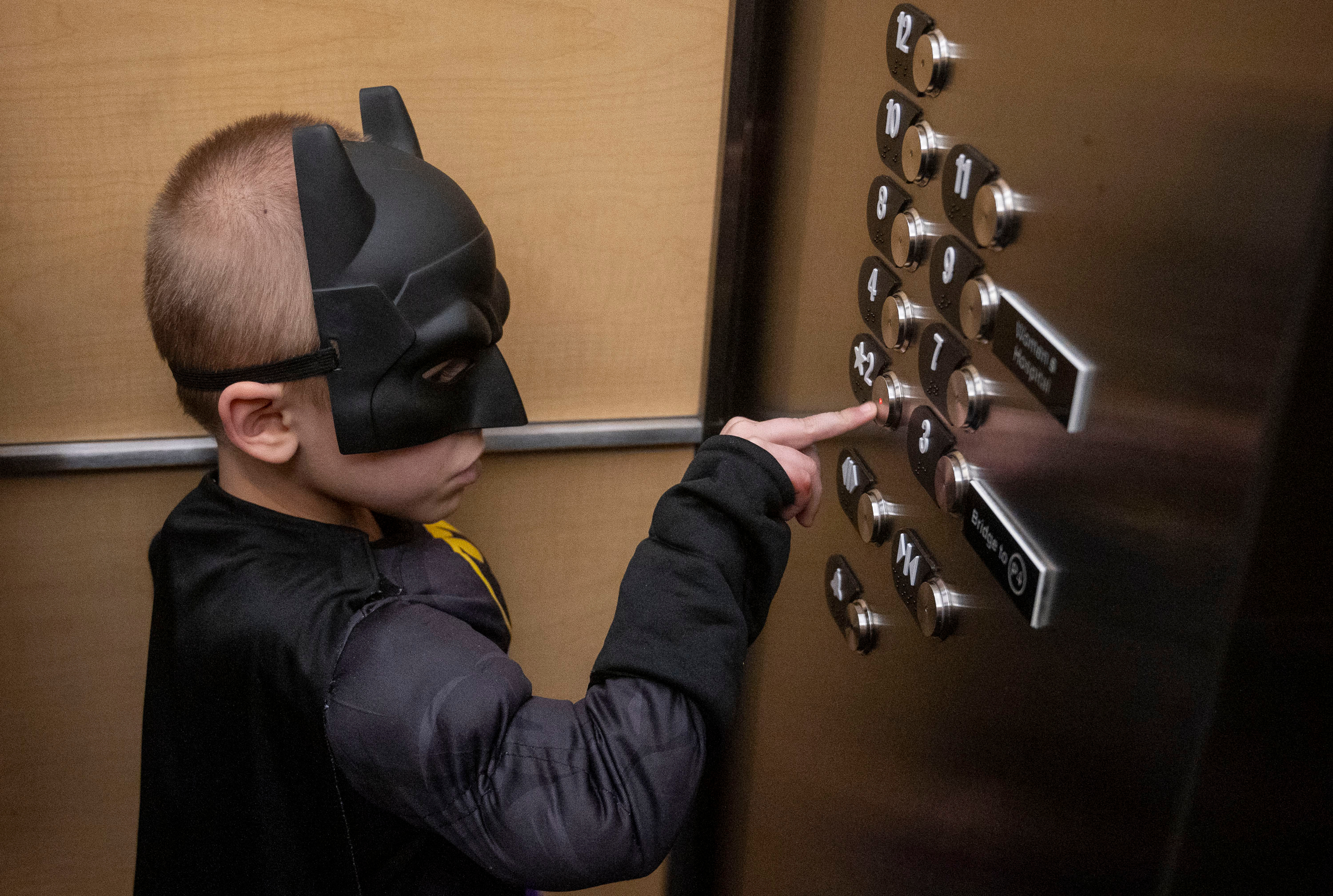5-year-old Grayson Johnson brings superhero outfits, enthusiasm to C.S ...