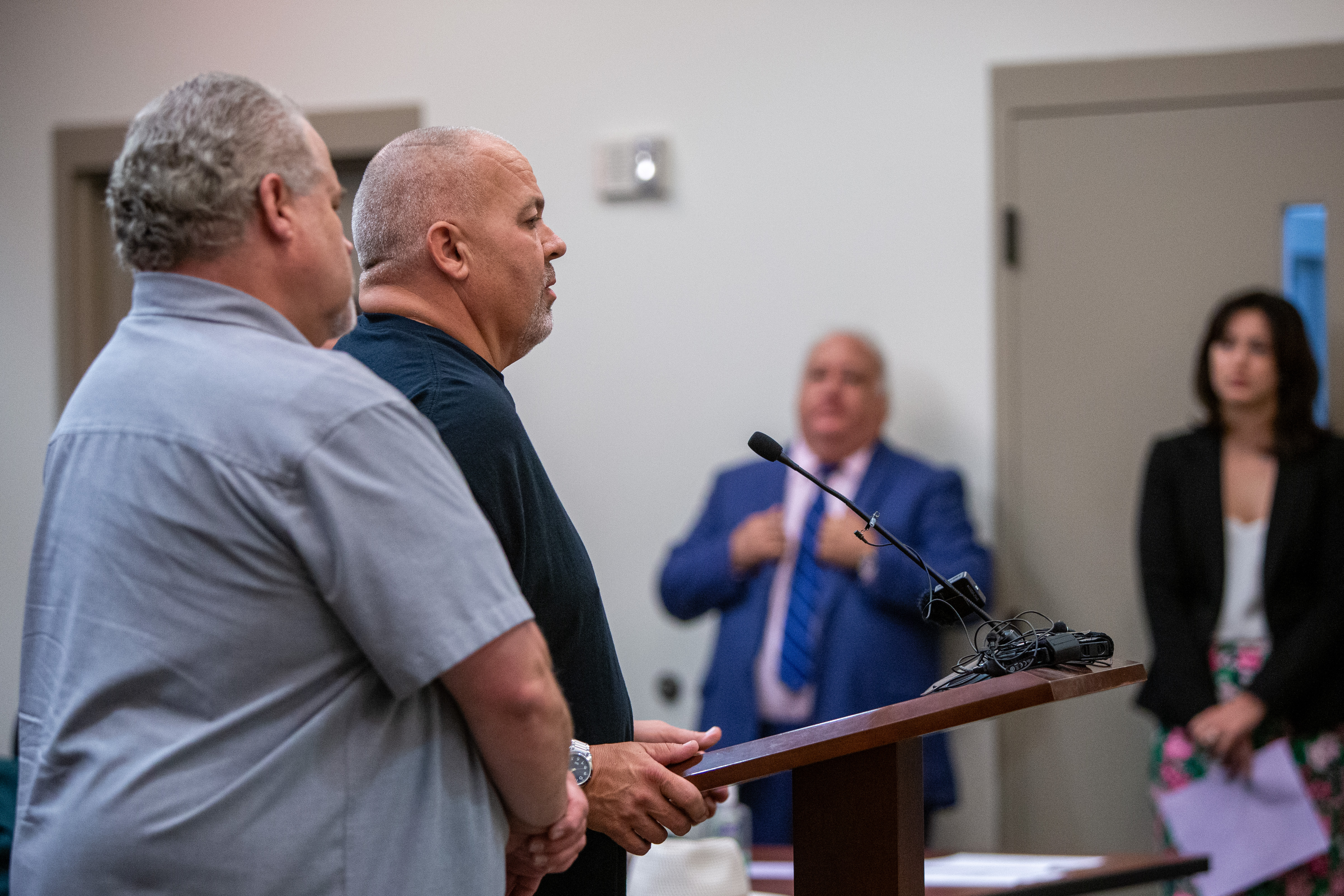 Three sentenced for killing church choir director at ATM - mlive.com