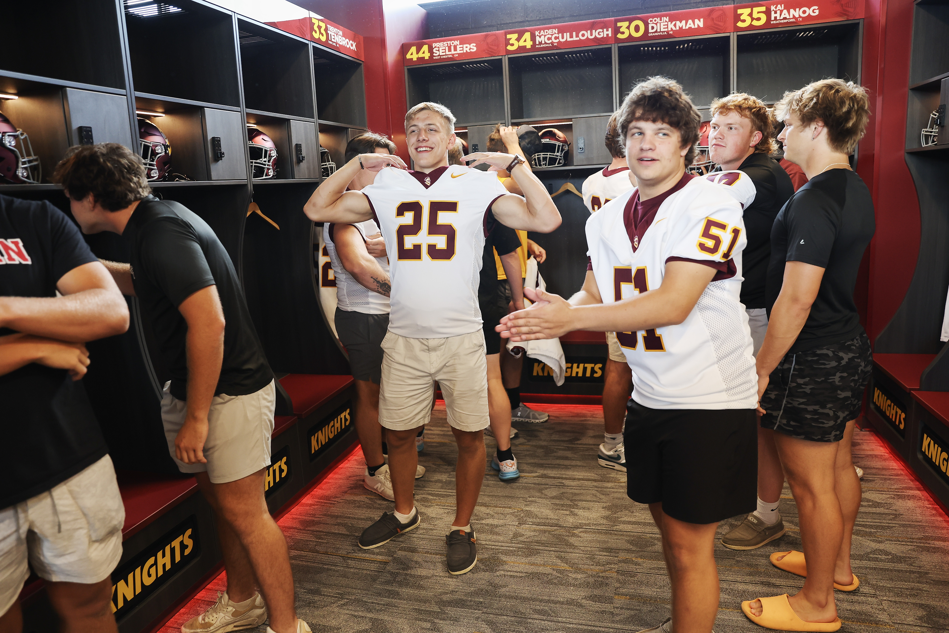 Calvin football players see their newly built locker room for the first ...