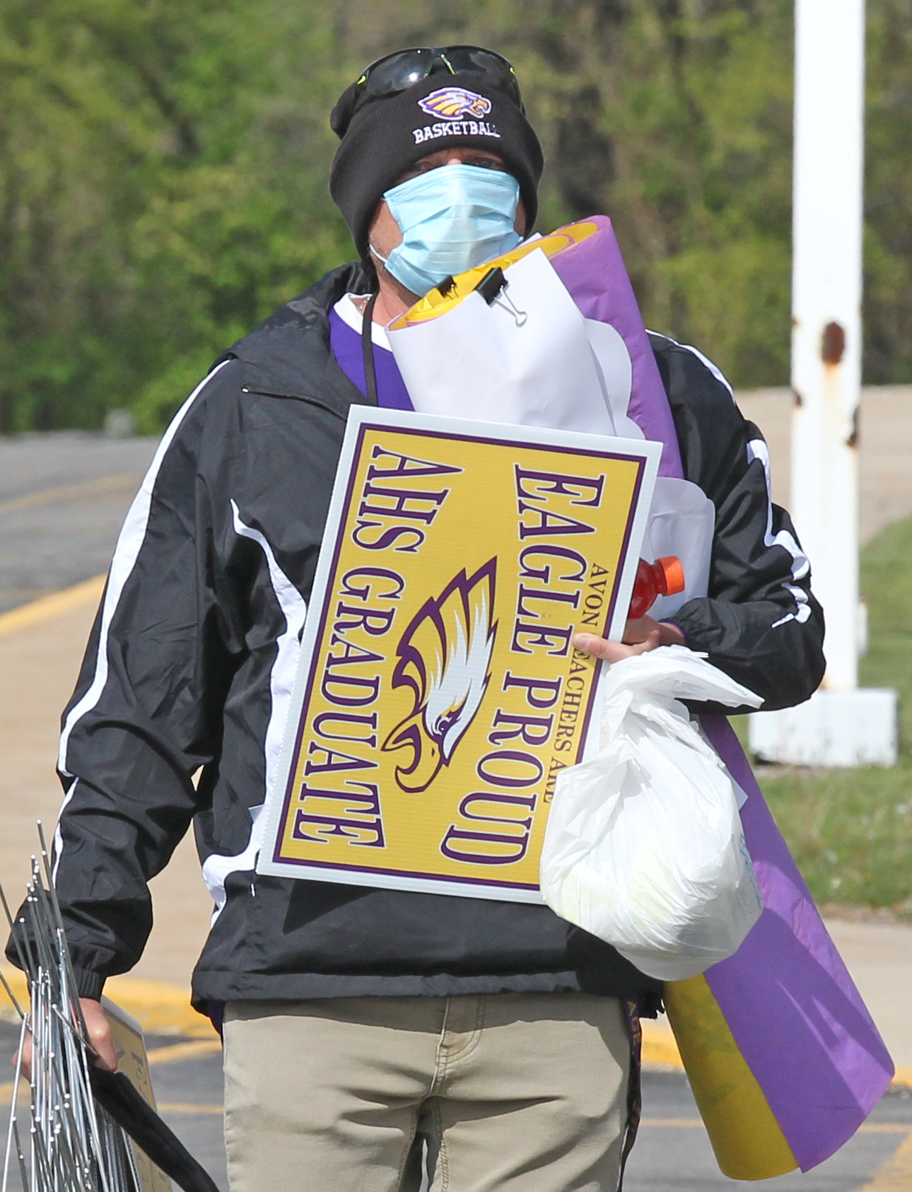 Avon High School uses school buses to deliver senior graduation signs ...