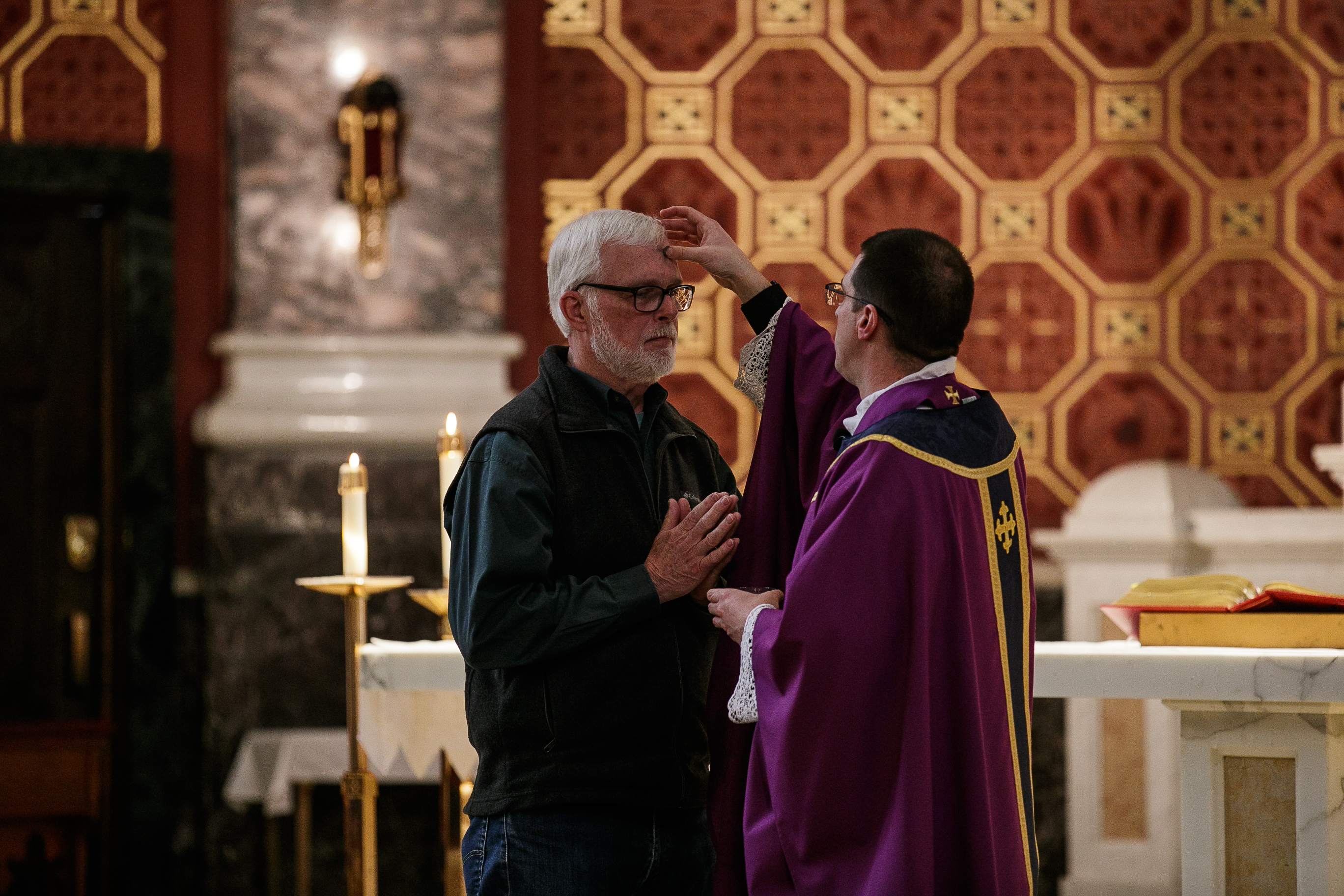 Community members attend the Ash Wednesday service at St. Matthew's ...