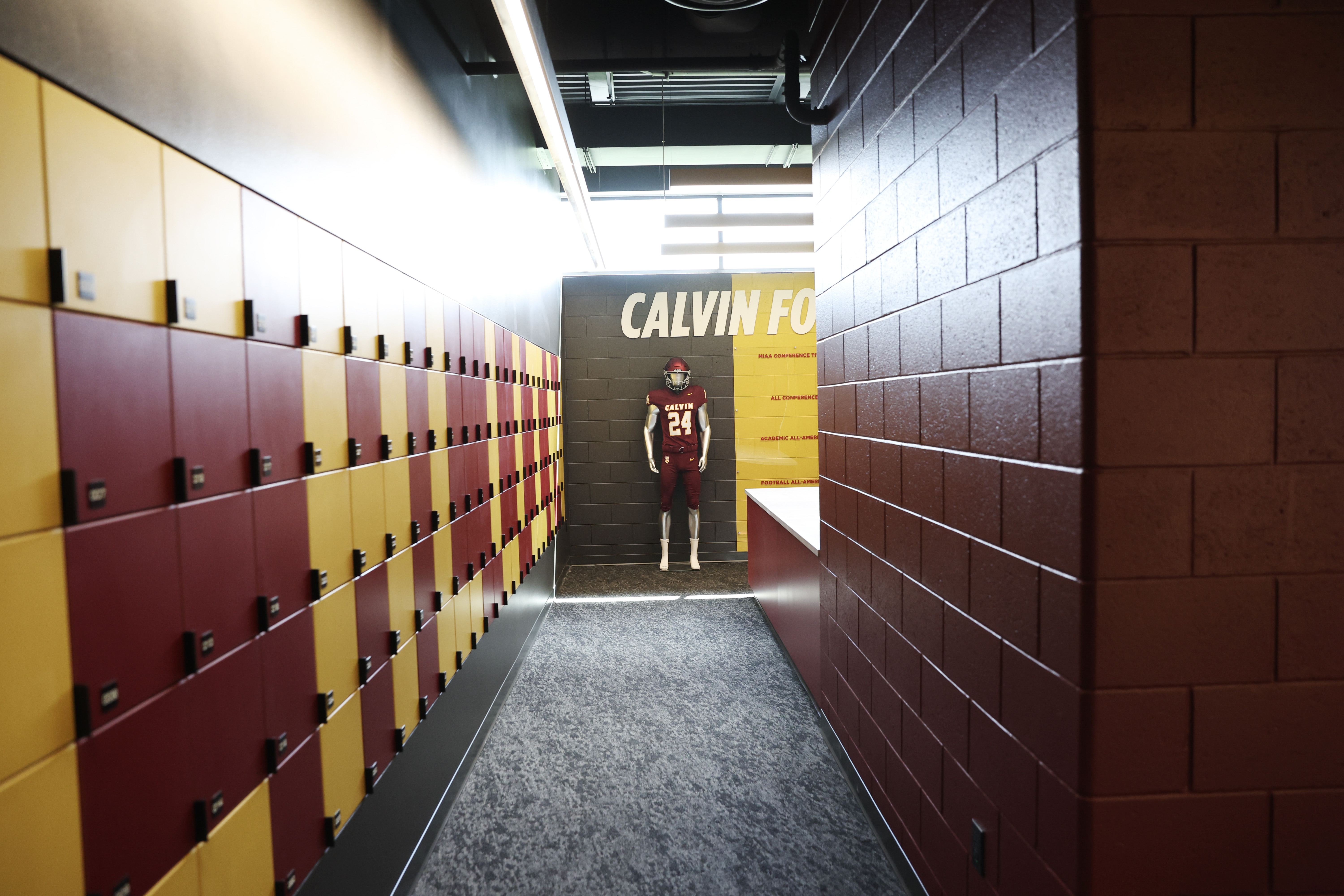 Calvin football players see their newly built locker room for the first ...
