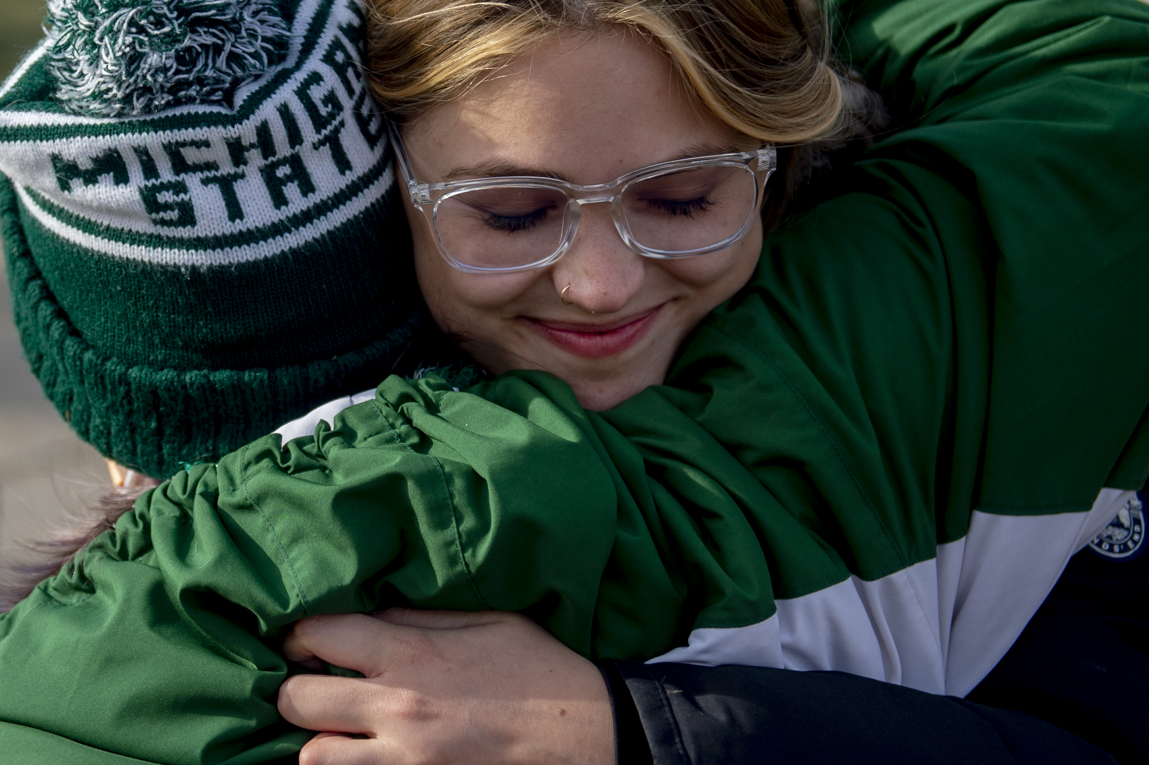 MSU students welcomed with warm embrace with "free Mom hugs" - mlive.com