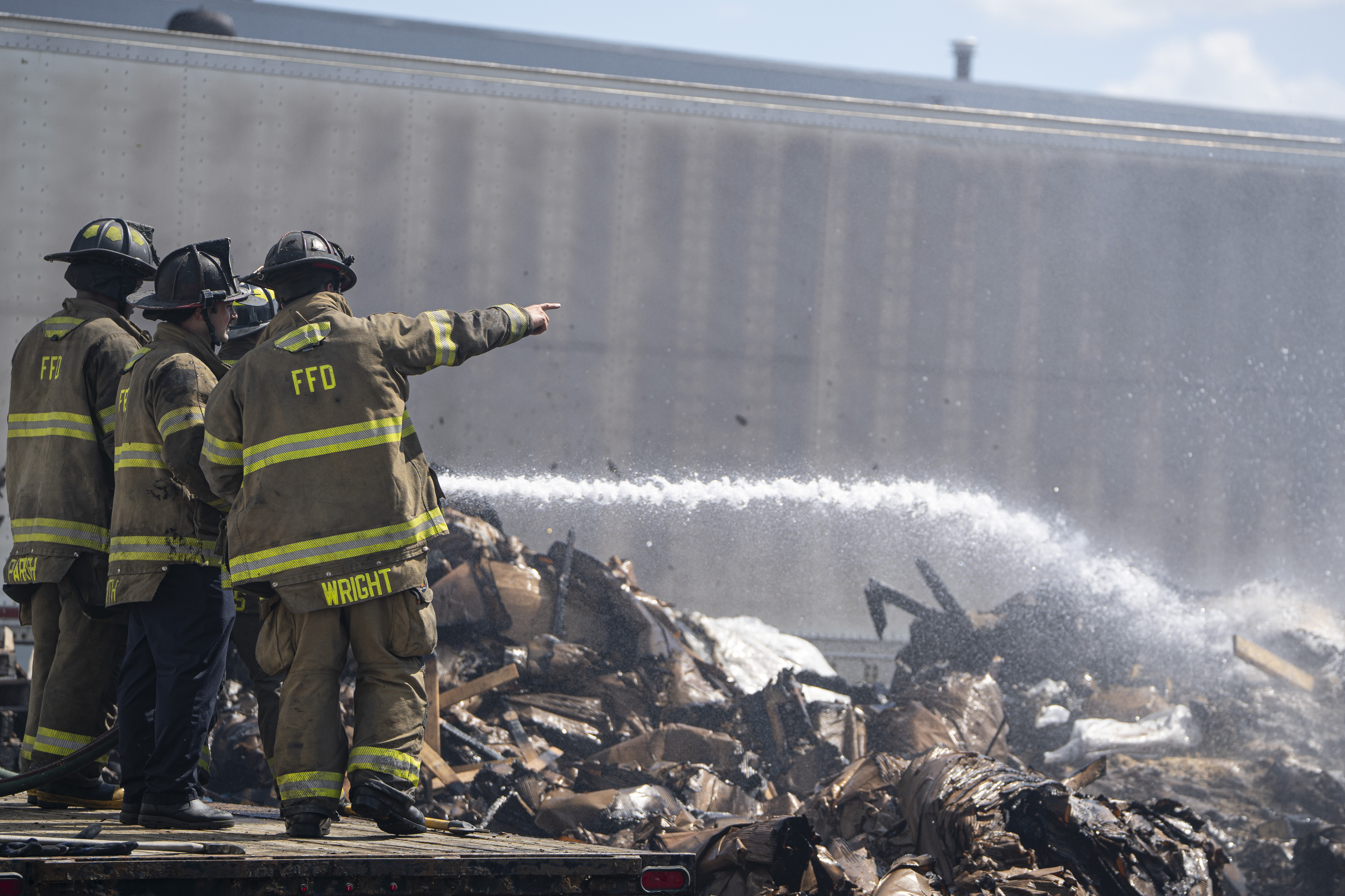 Firefighters work to extinguish a fire at D.I. Enterprises - mlive.com