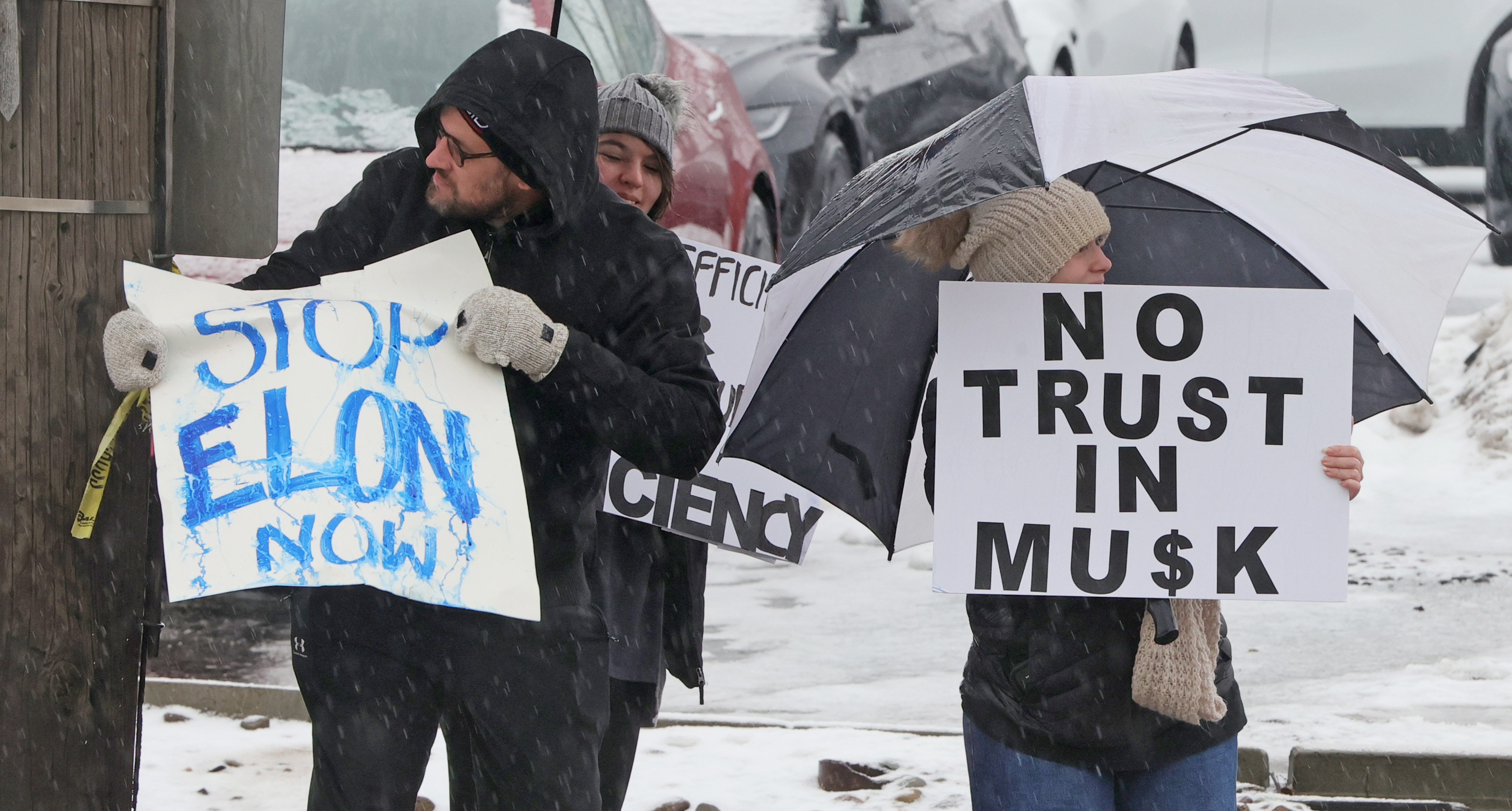 Rally at Tesla Motors Cleveland in Lyndhurst in protest of Elon Musk’s ...