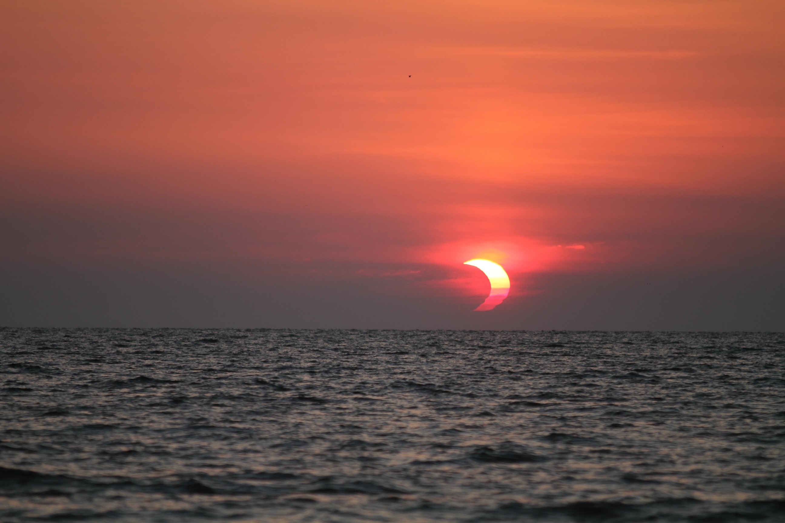 Sunrise solar eclipse over Lake Huron - mlive.com