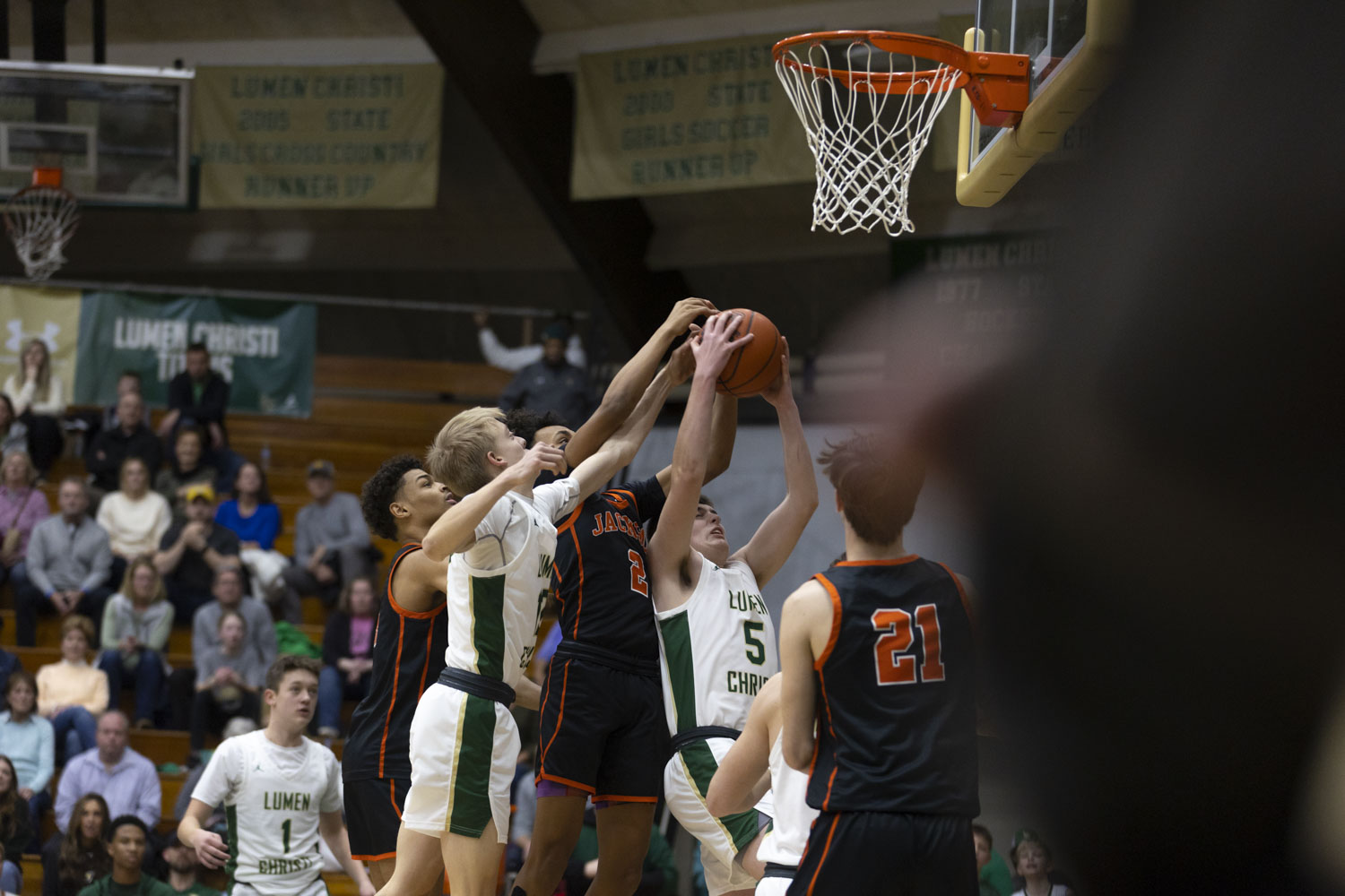 See photos as Jackson tops Lumen Christi in a boys basketball game ...