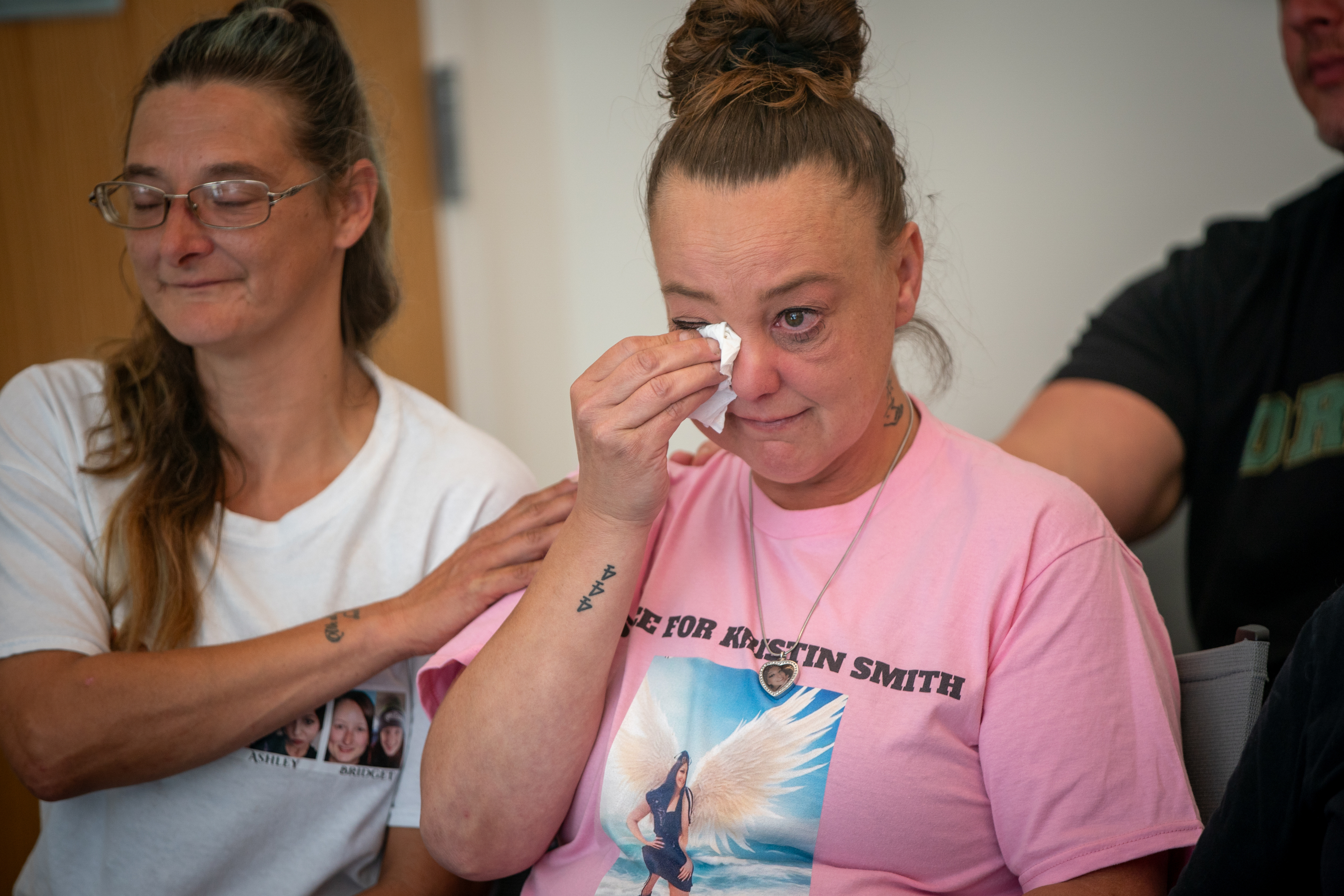 Families of victims react as prosecutors file new murder charge against ...
