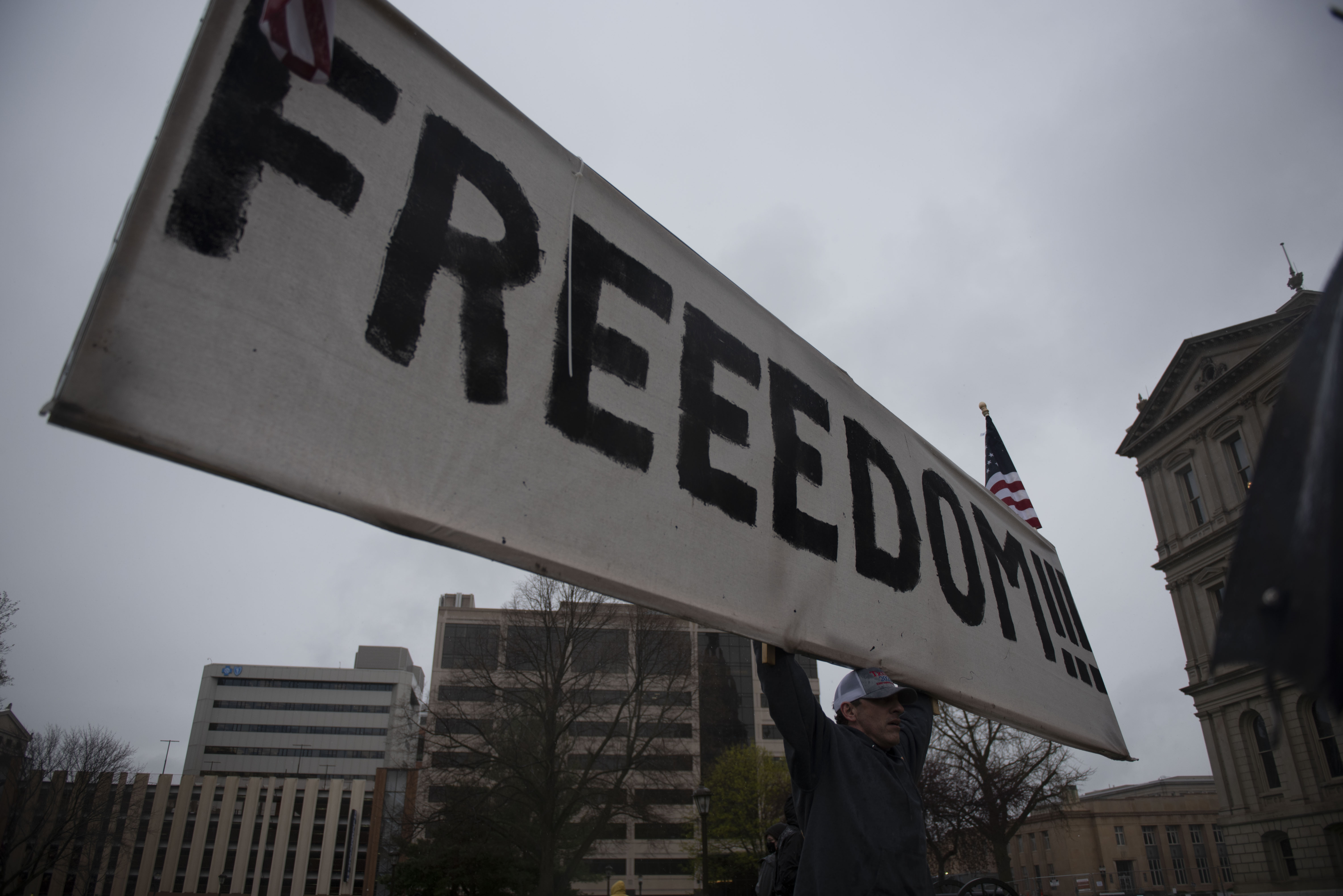Protesters congregate at Michigan Capitol in rally against stay-home ...