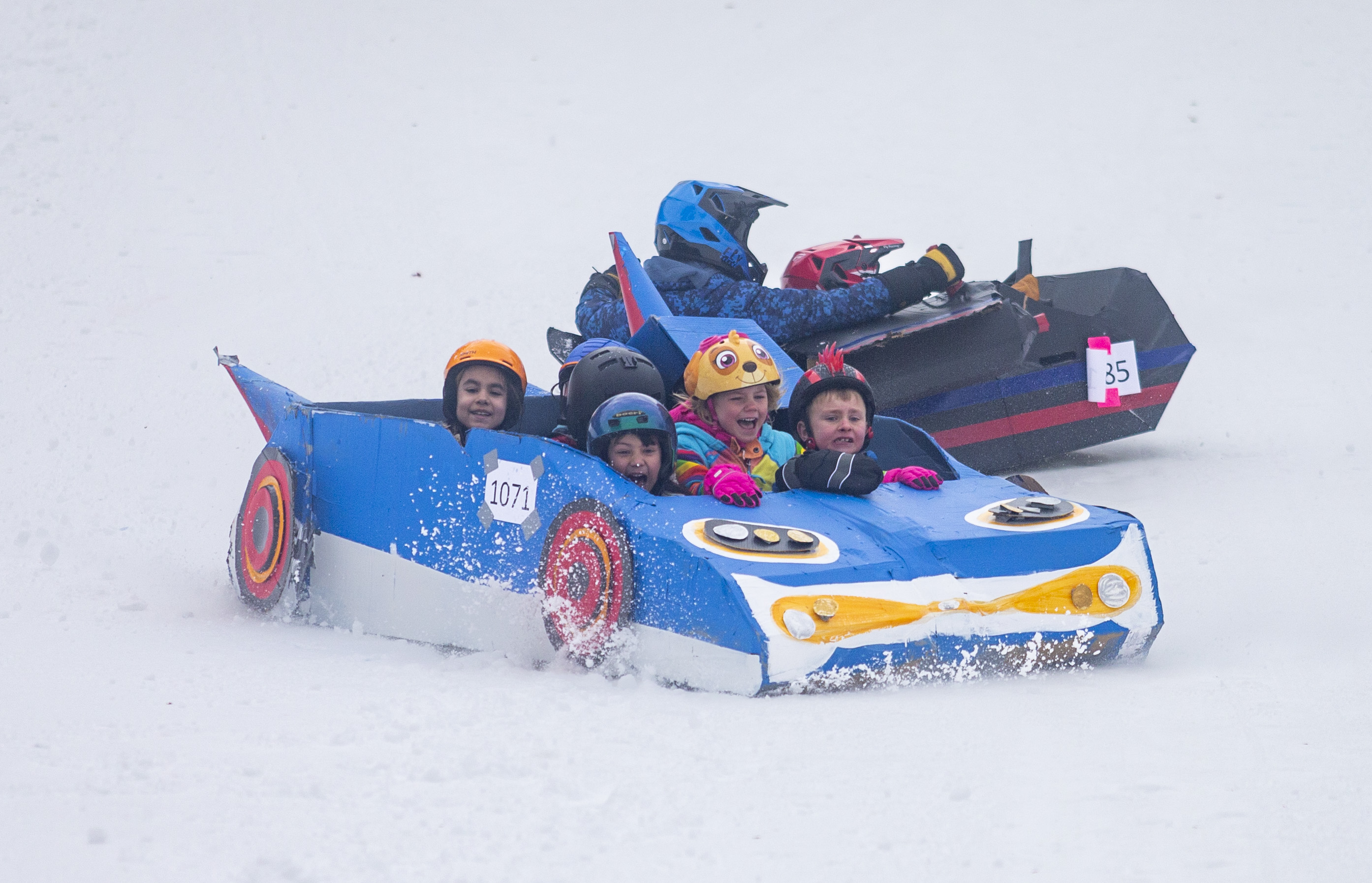 Cardboard sled race at Grand Haven Winterfest 2025 - mlive.com
