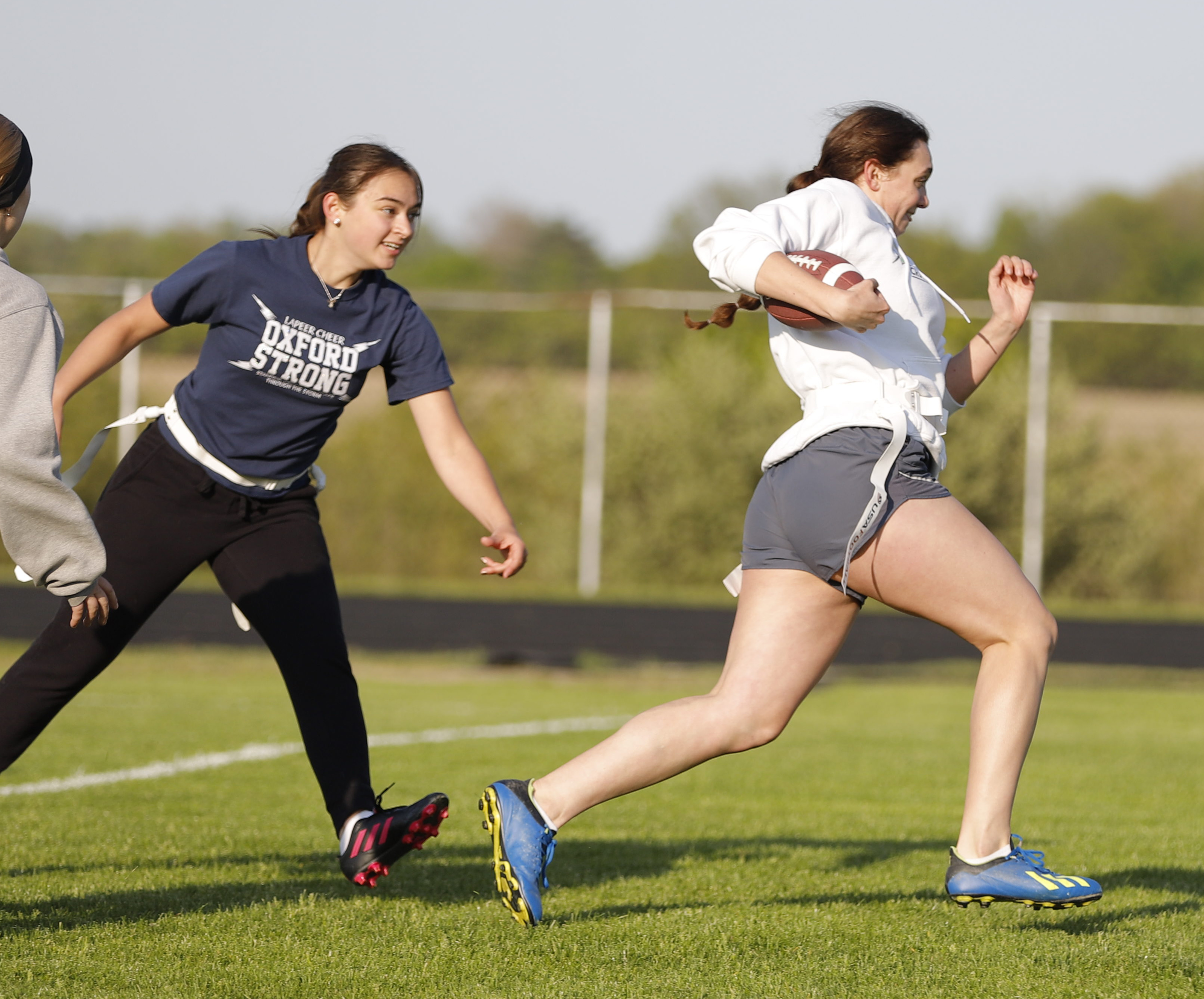 Lapeer high school girls participate in flag football pilot league ...