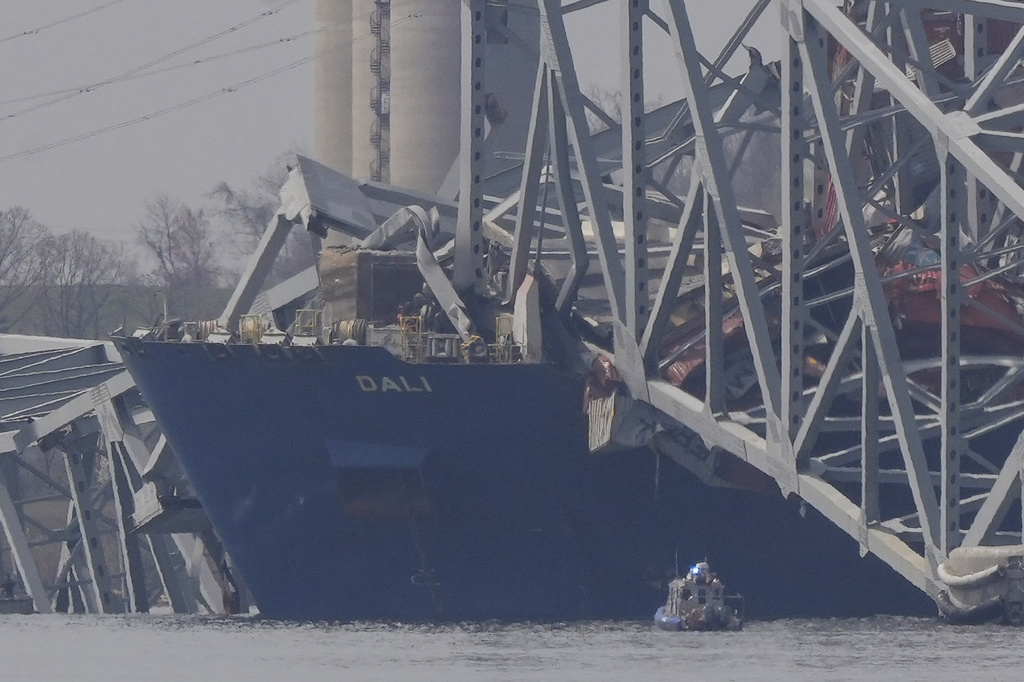 Baltimore bridge collapses after powerless cargo ship rams into support ...