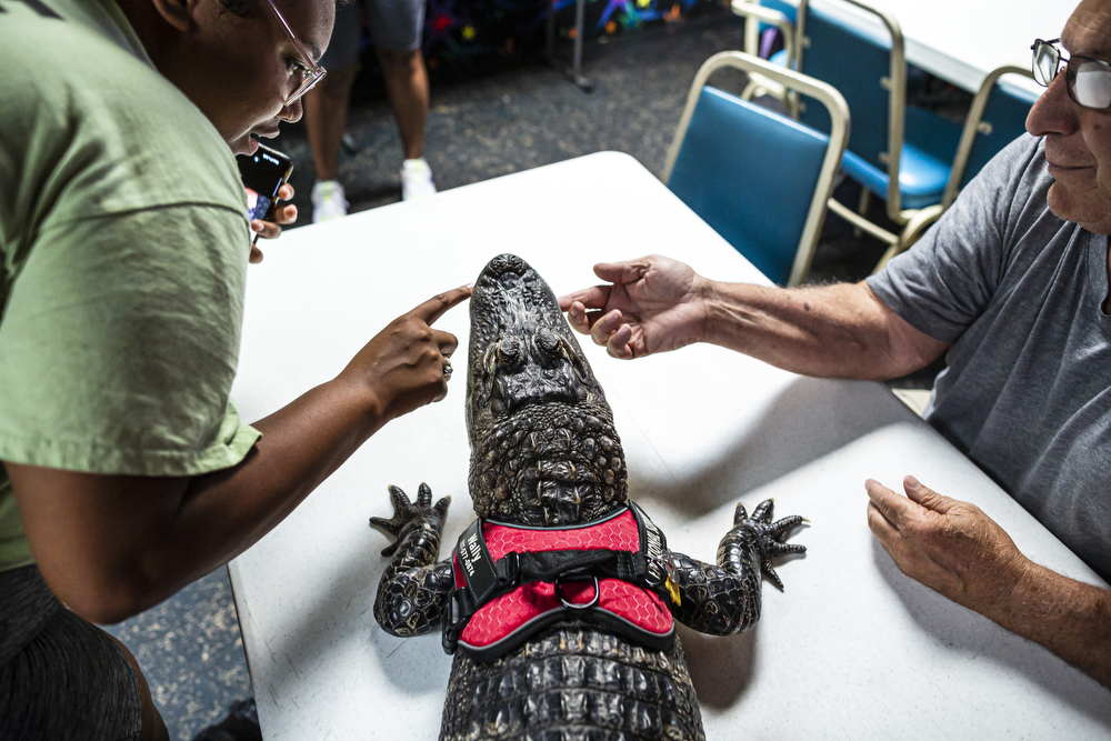 Joie Henney and Wally the emotional support alligator - pennlive.com