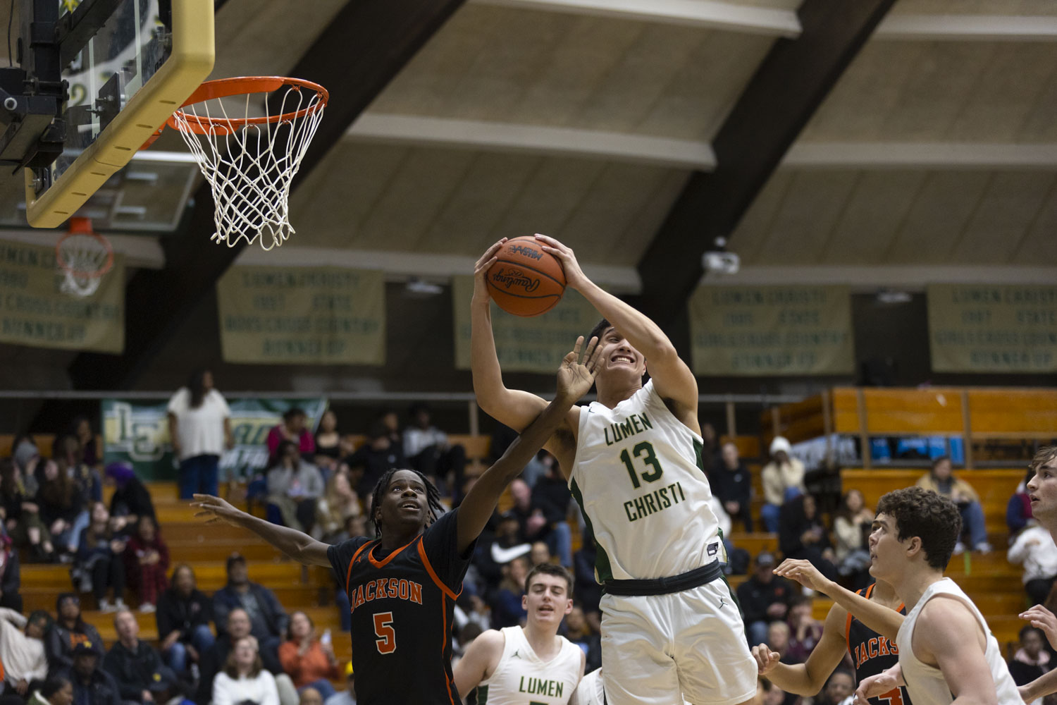 See photos as Jackson tops Lumen Christi in a boys basketball game ...