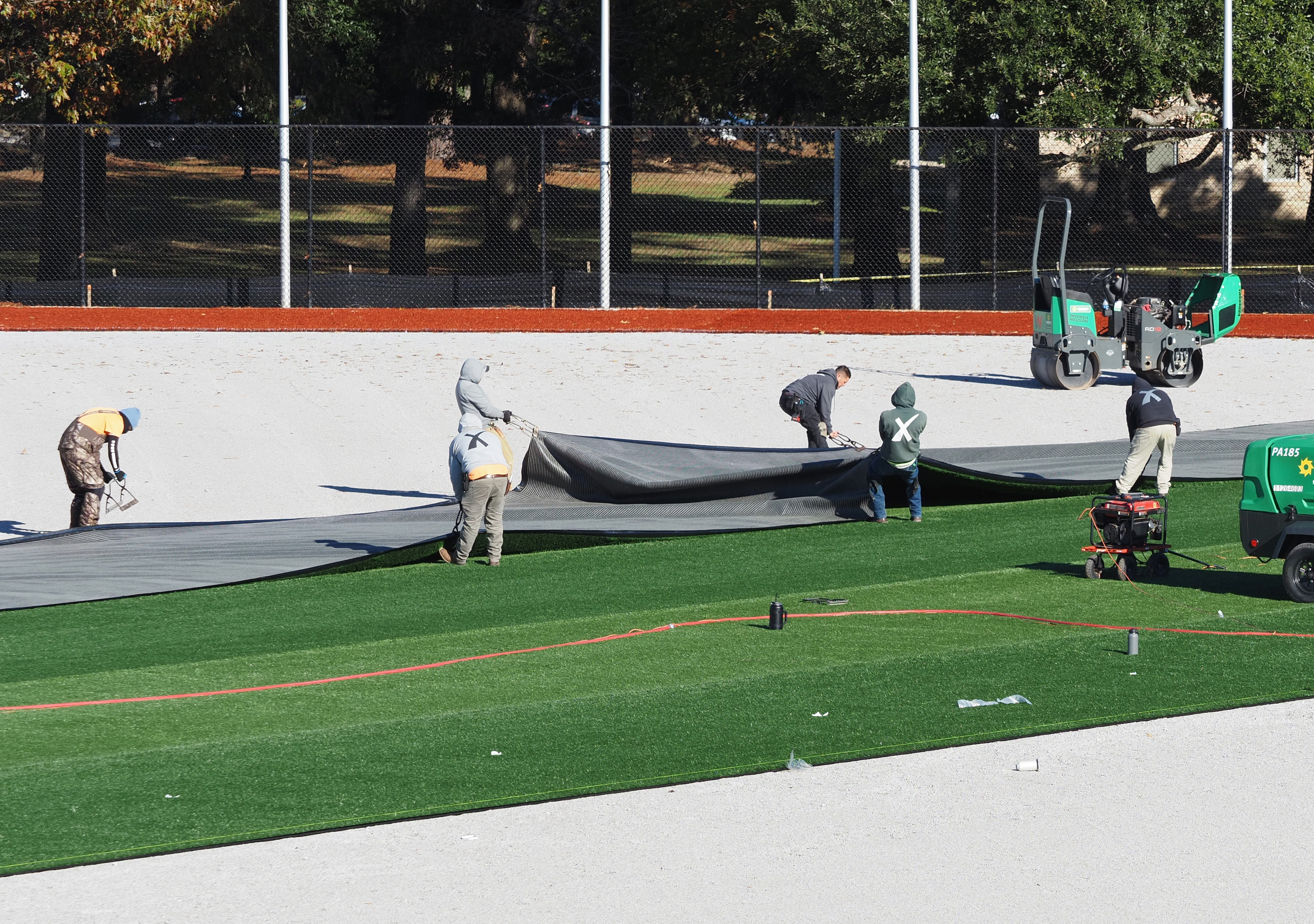 Stanky Field artificial turf installation - al.com