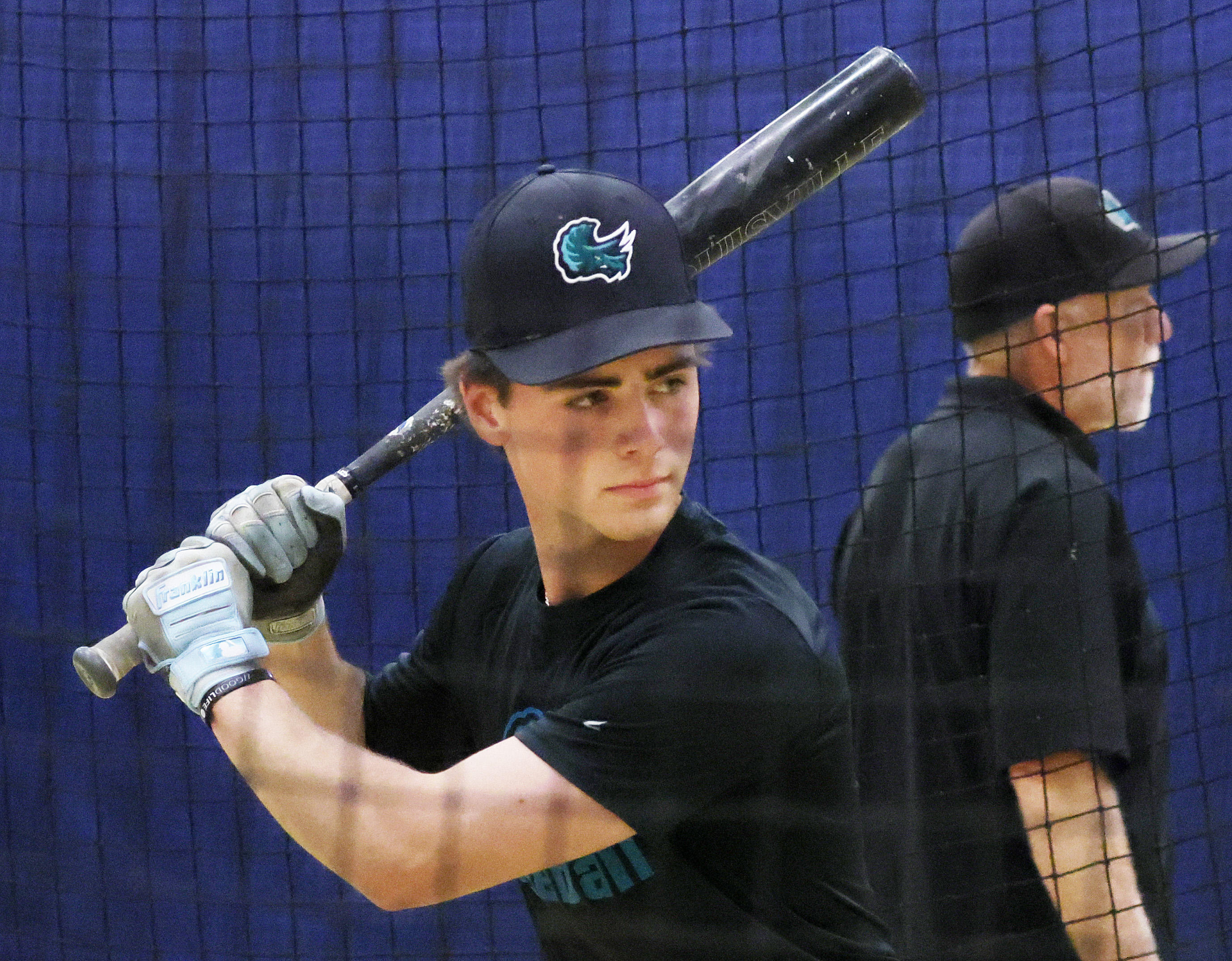 The Tri-C Triceratops baseball team practices before the start of their ...