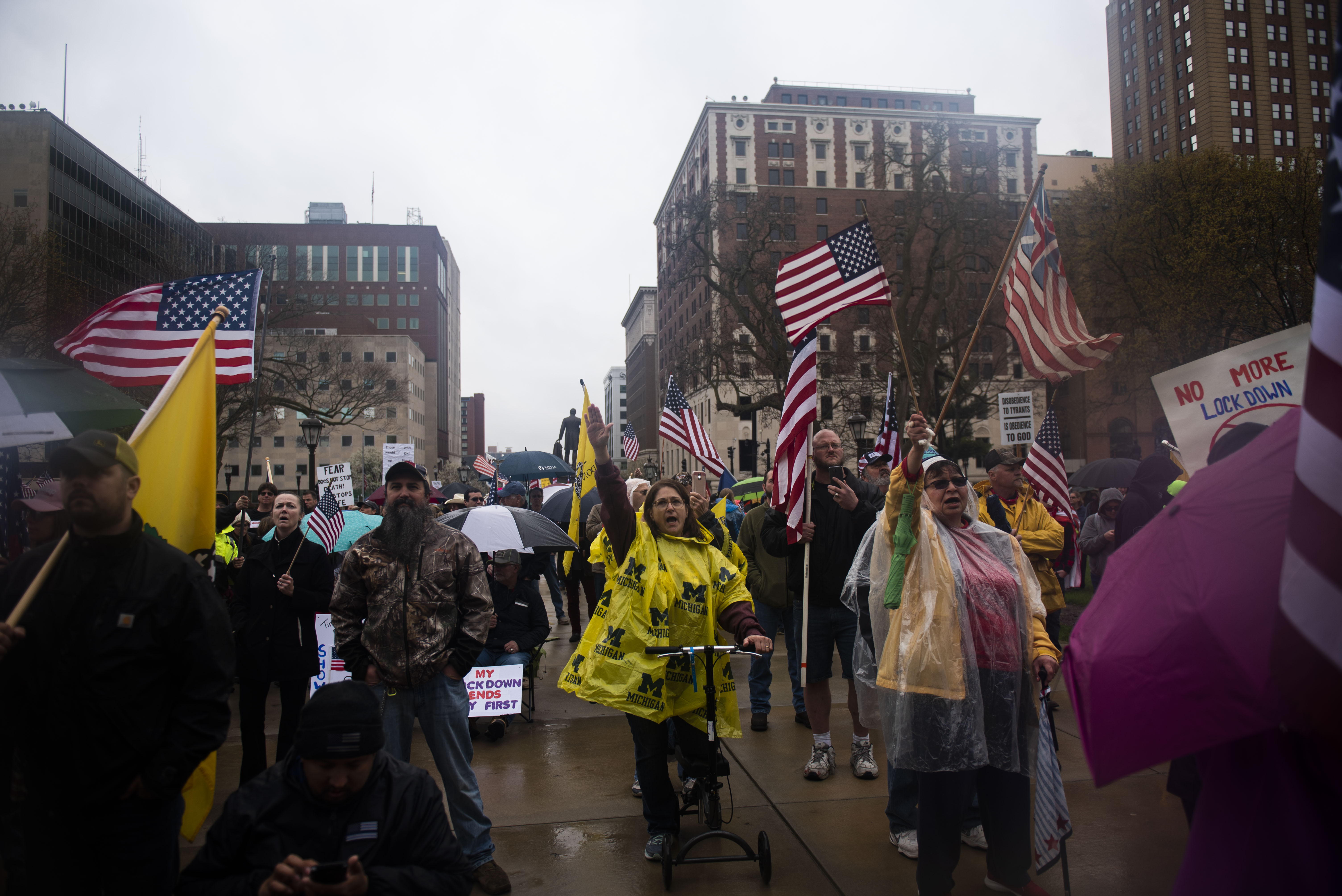 Protesters congregate at Michigan Capitol in rally against stay-home ...