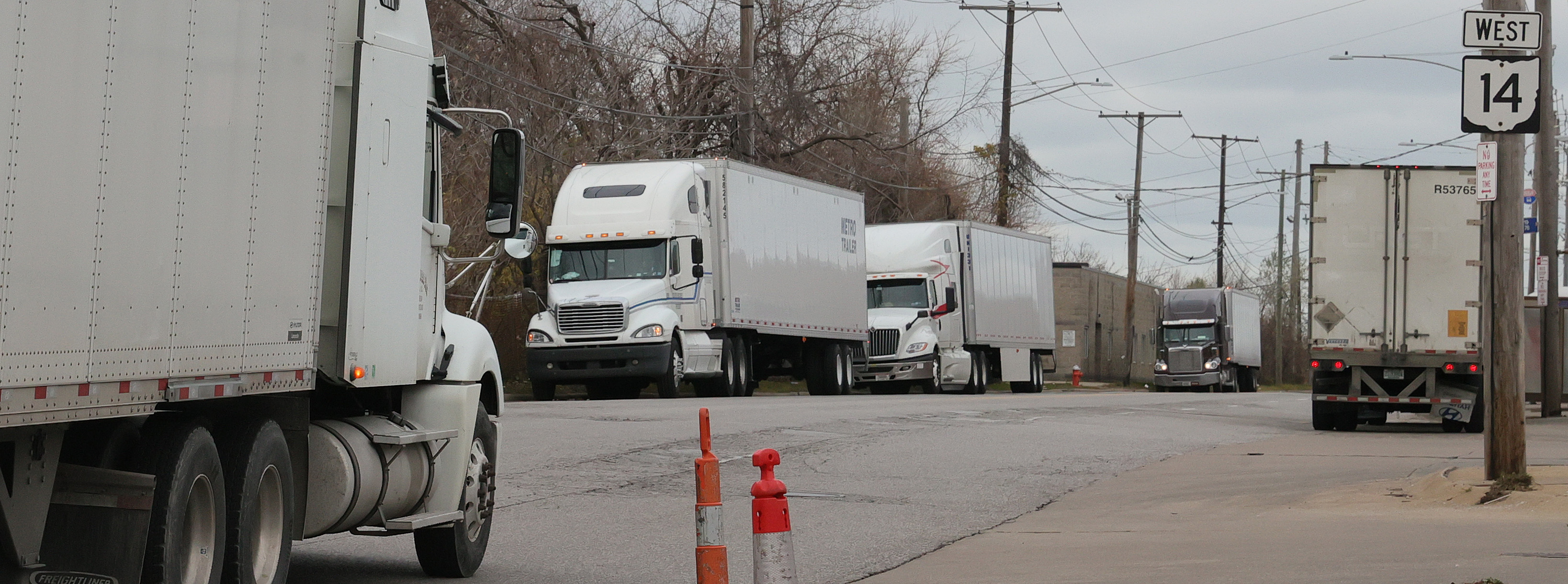 Trucks wait to unload USPS packages at Cleveland distribution center ...