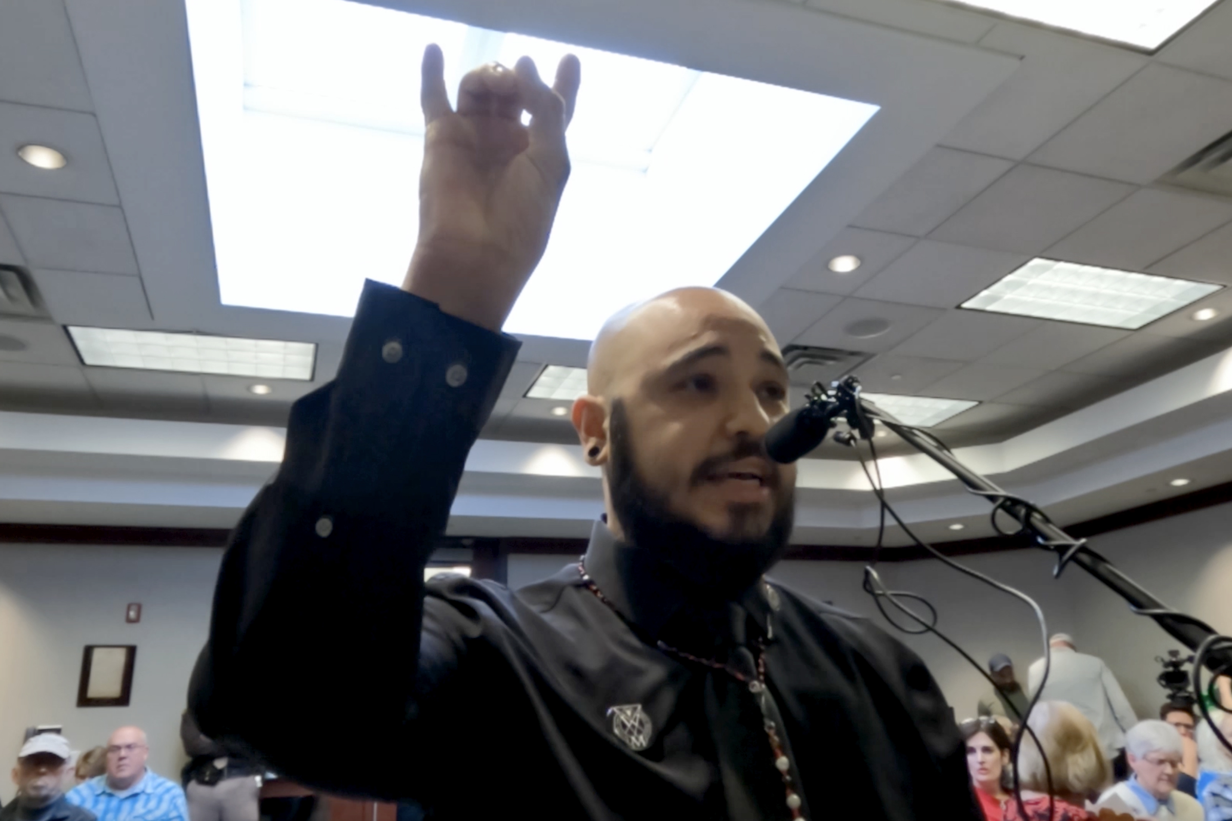 Satanic Temple gives invocation at Ottawa County Board meeting - mlive.com